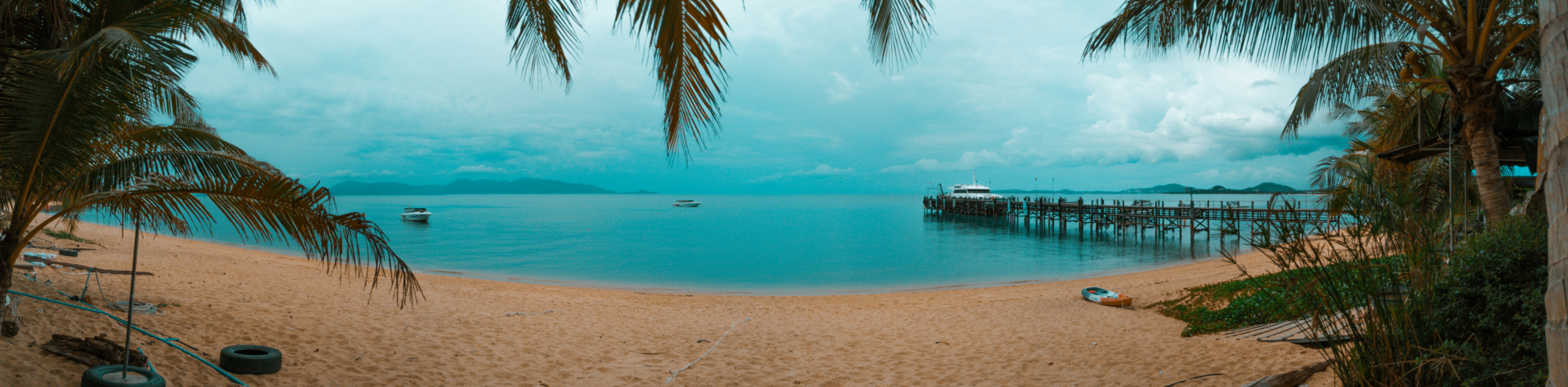 ko phangan | brown sand beside body of water at daytime