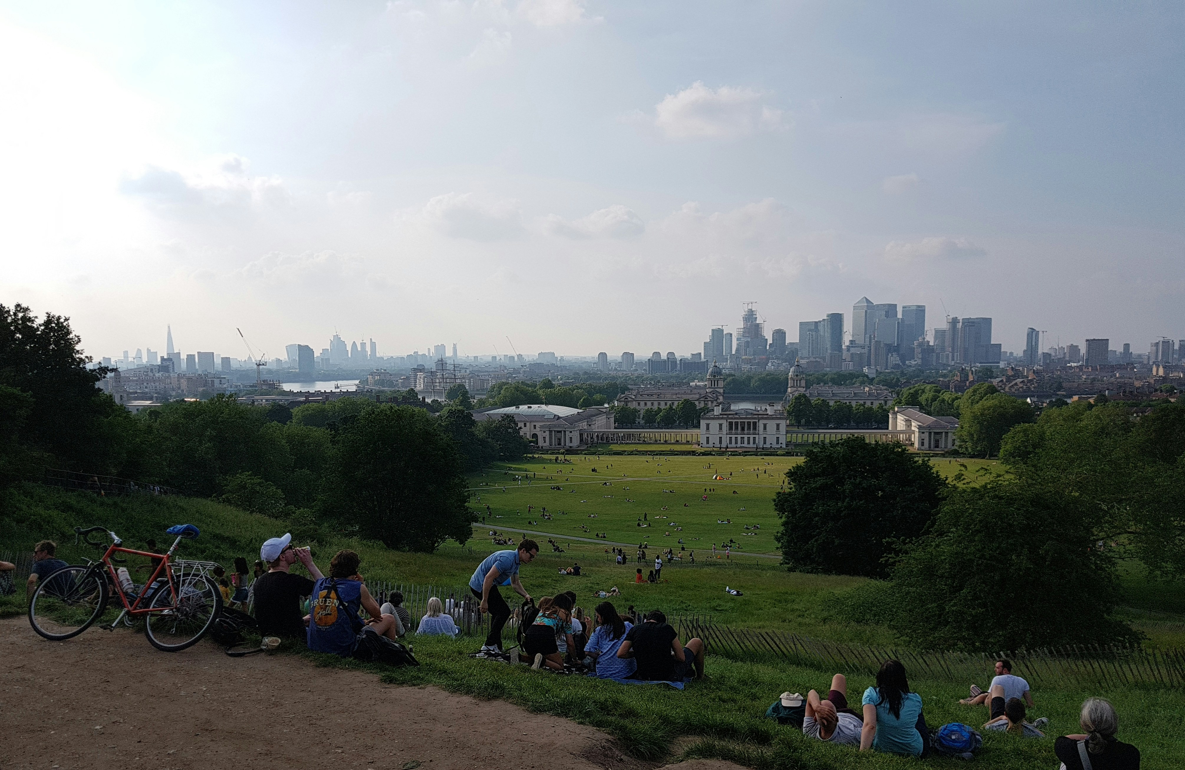 People sitting on grass near building during daytime photo – Free Grey ...