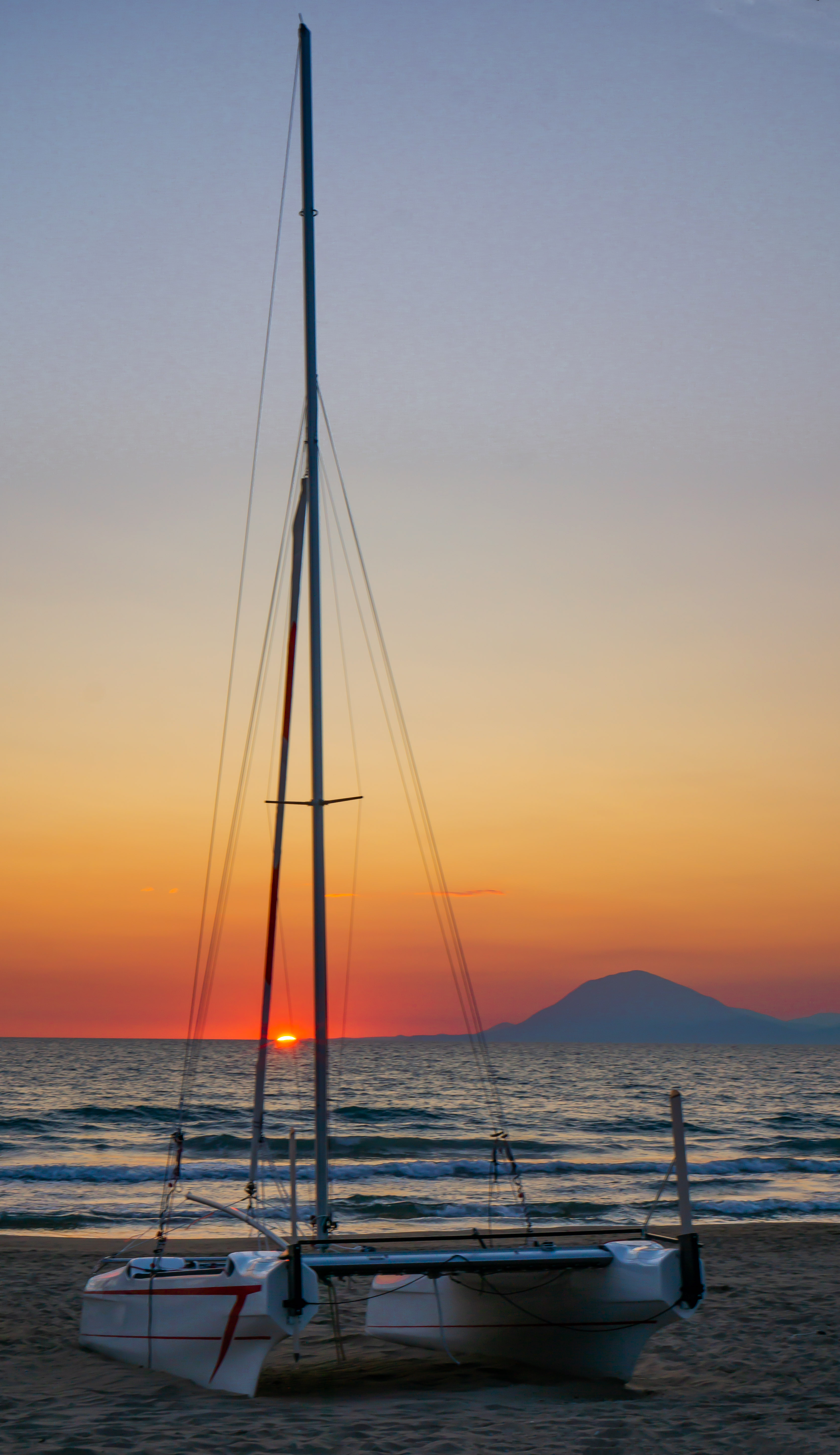 Sunset Sloop on Quiet Shore