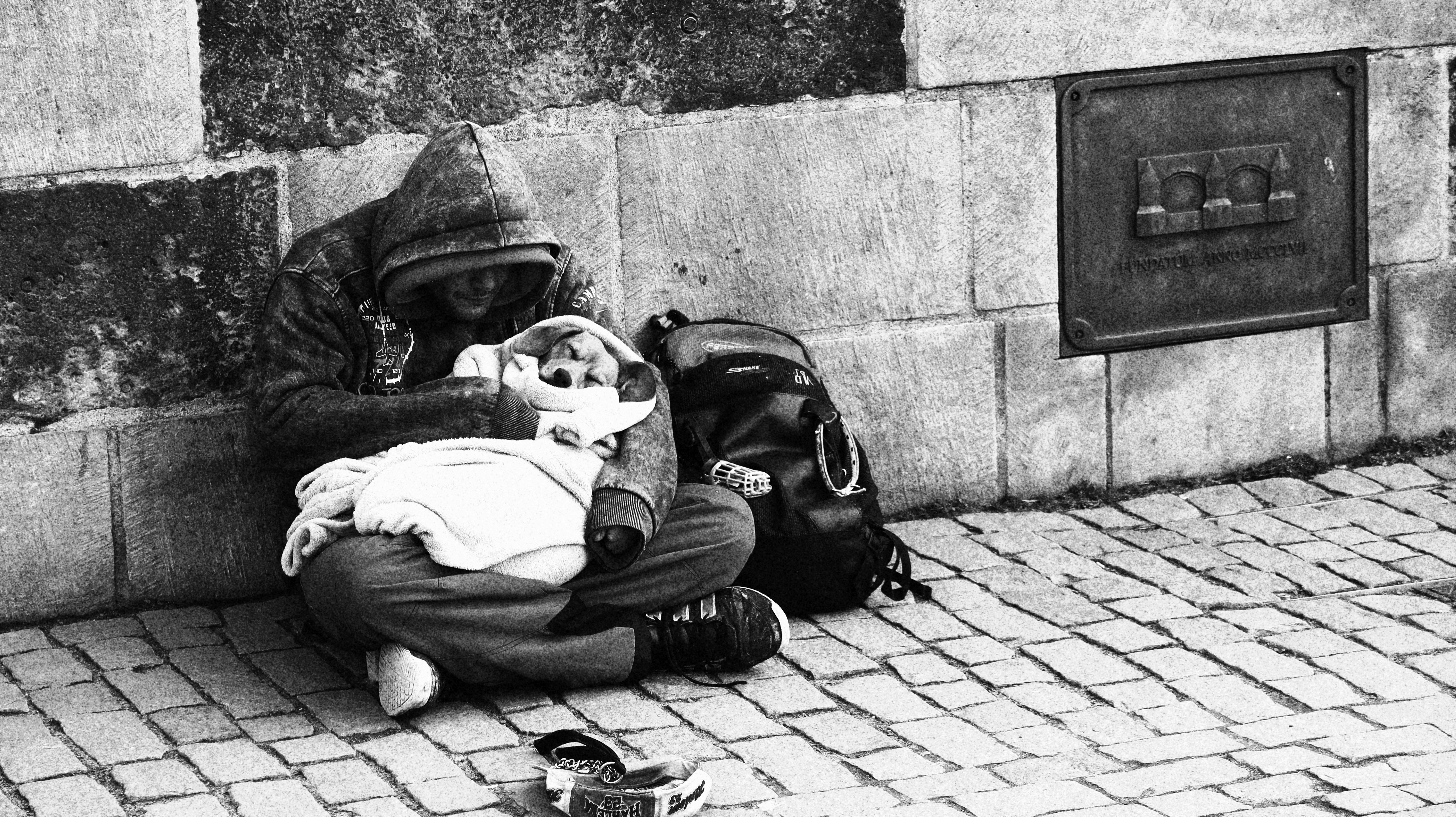 Man siting on grayscale photography photo – Free Begging Image on Unsplash