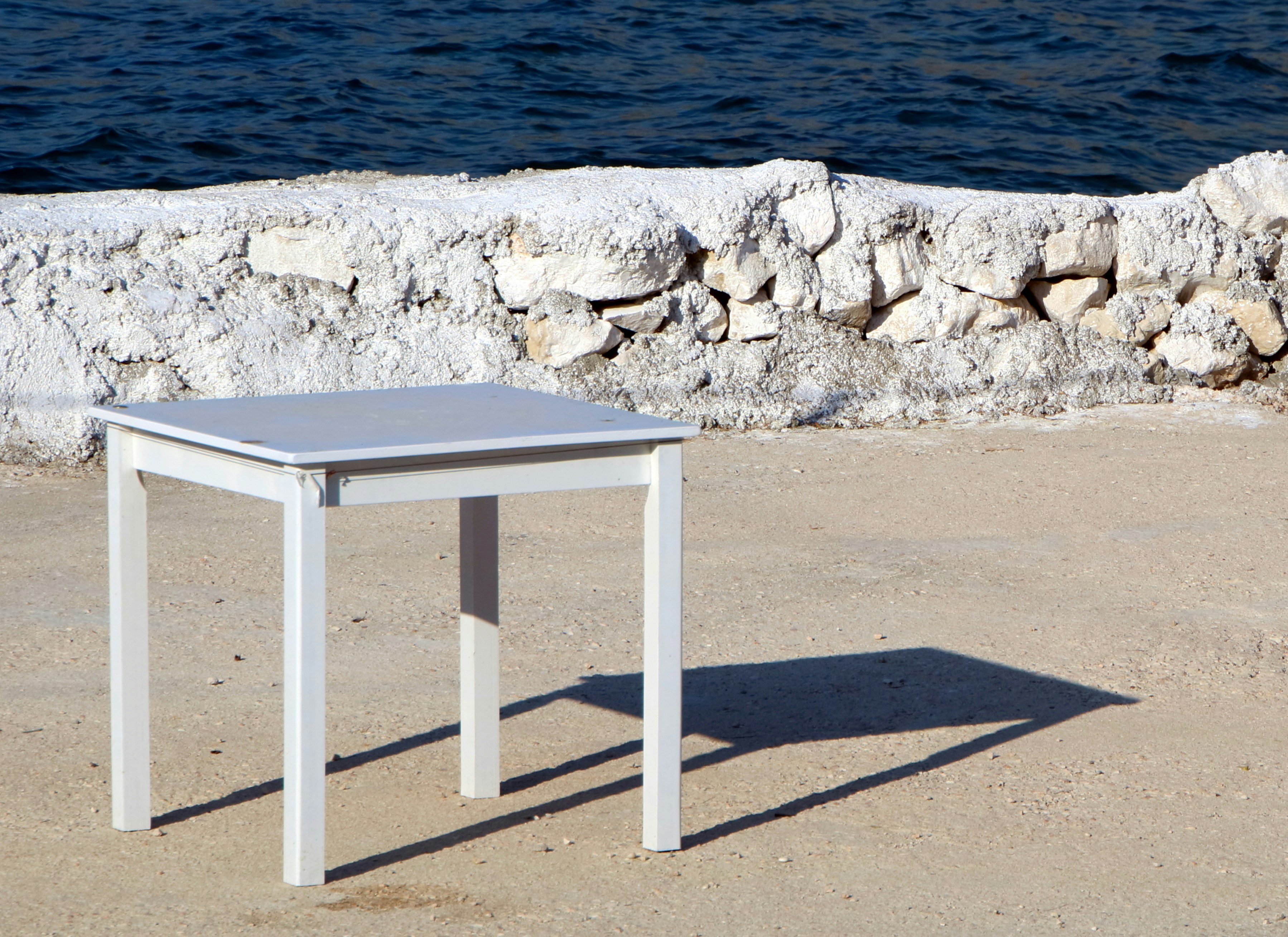 Table waiting for guests, the fisherman's hut, Zola, Kefalonia, June 2019