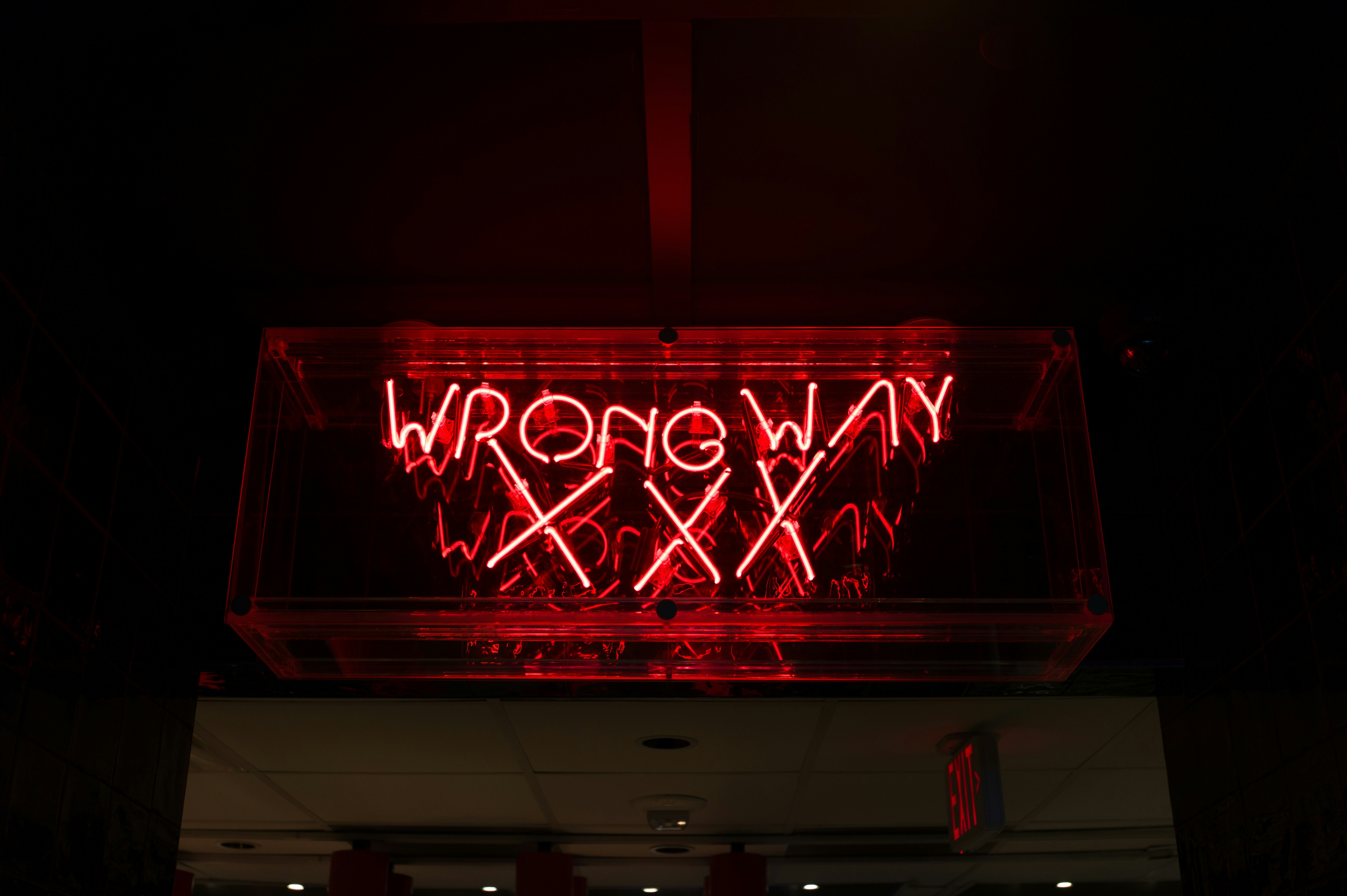 Red Wrong Way XXX neon signage photo – Free Brown Image on Unsplash