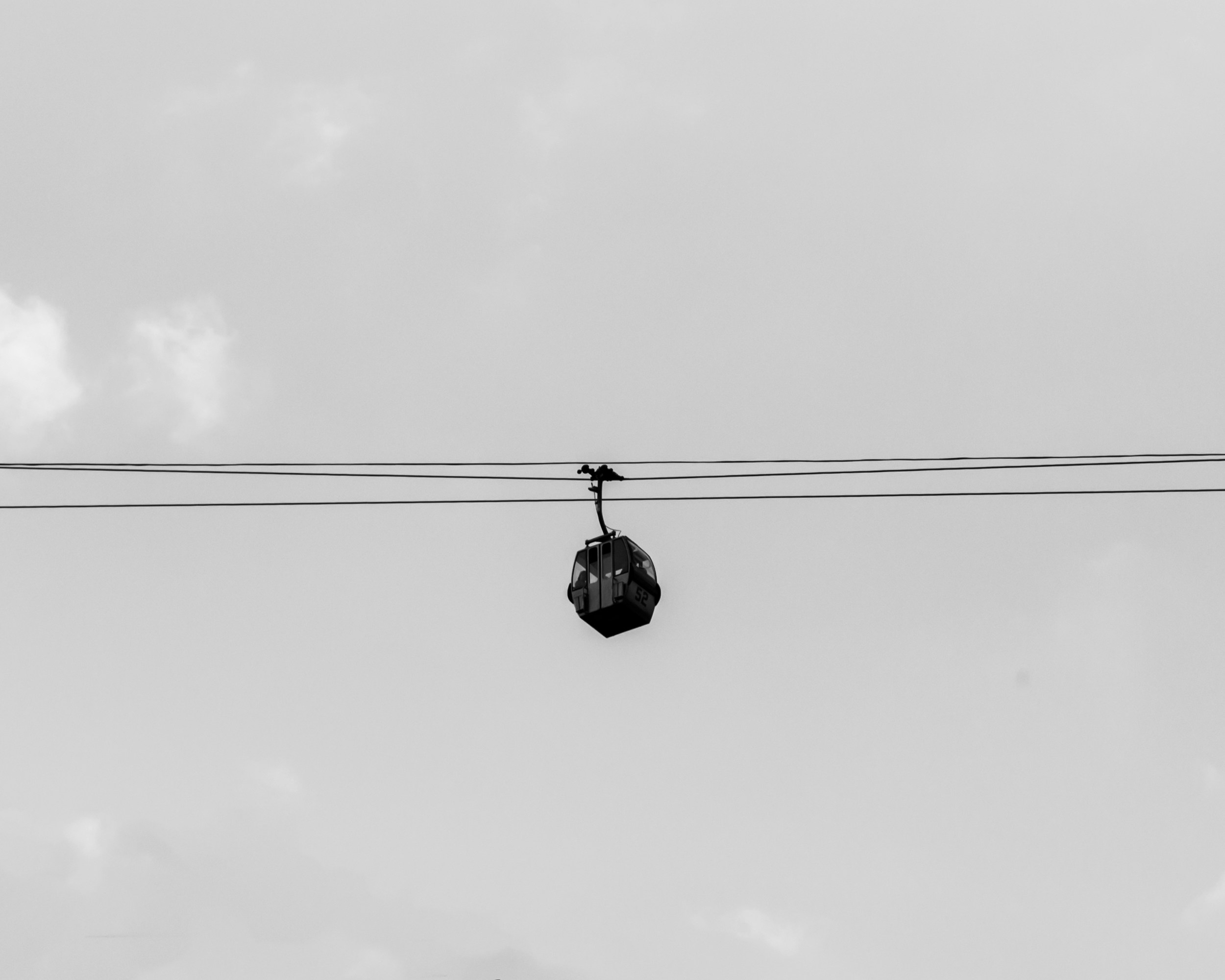 Suspended in Solitude: A Cable Car's Journey