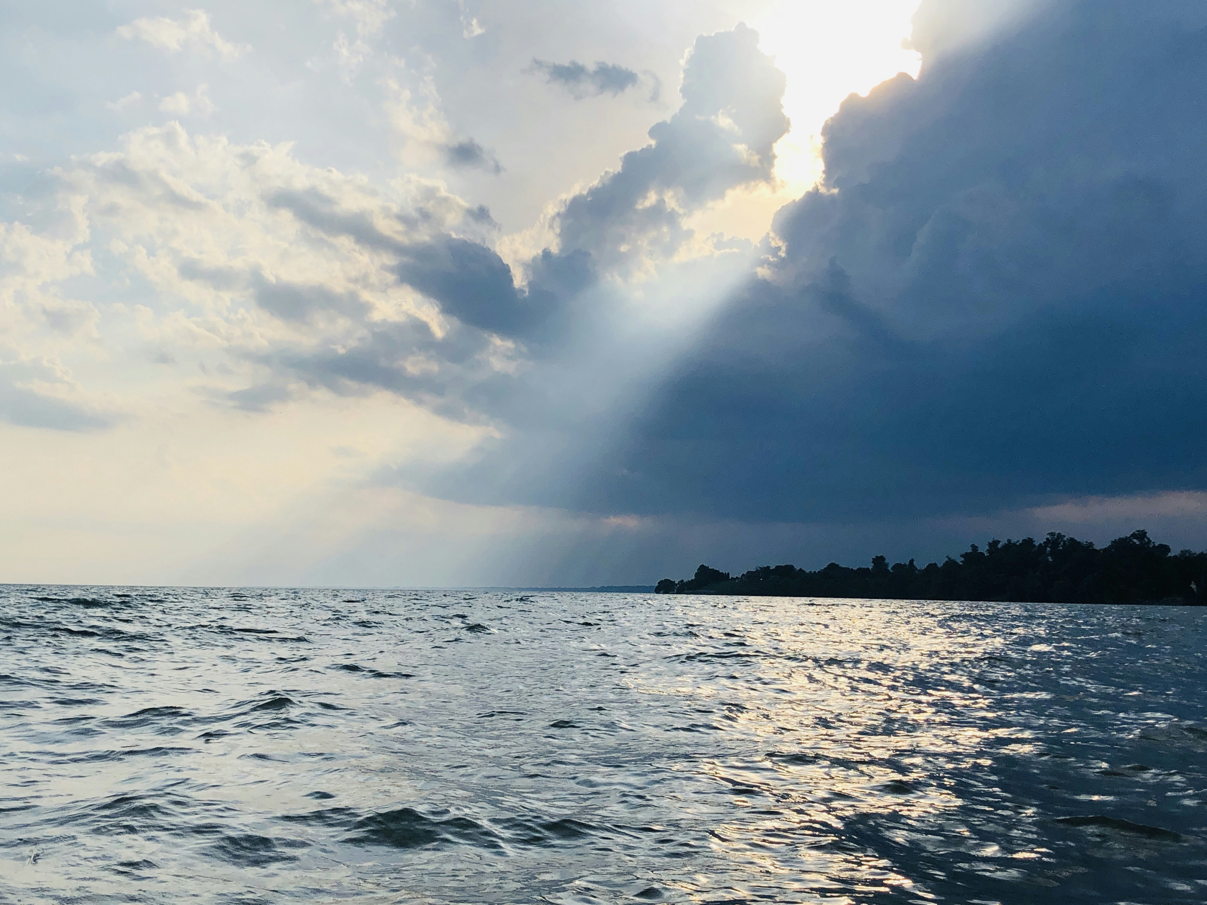 Calm sea during daytime photo – Free Sun Image on Unsplash