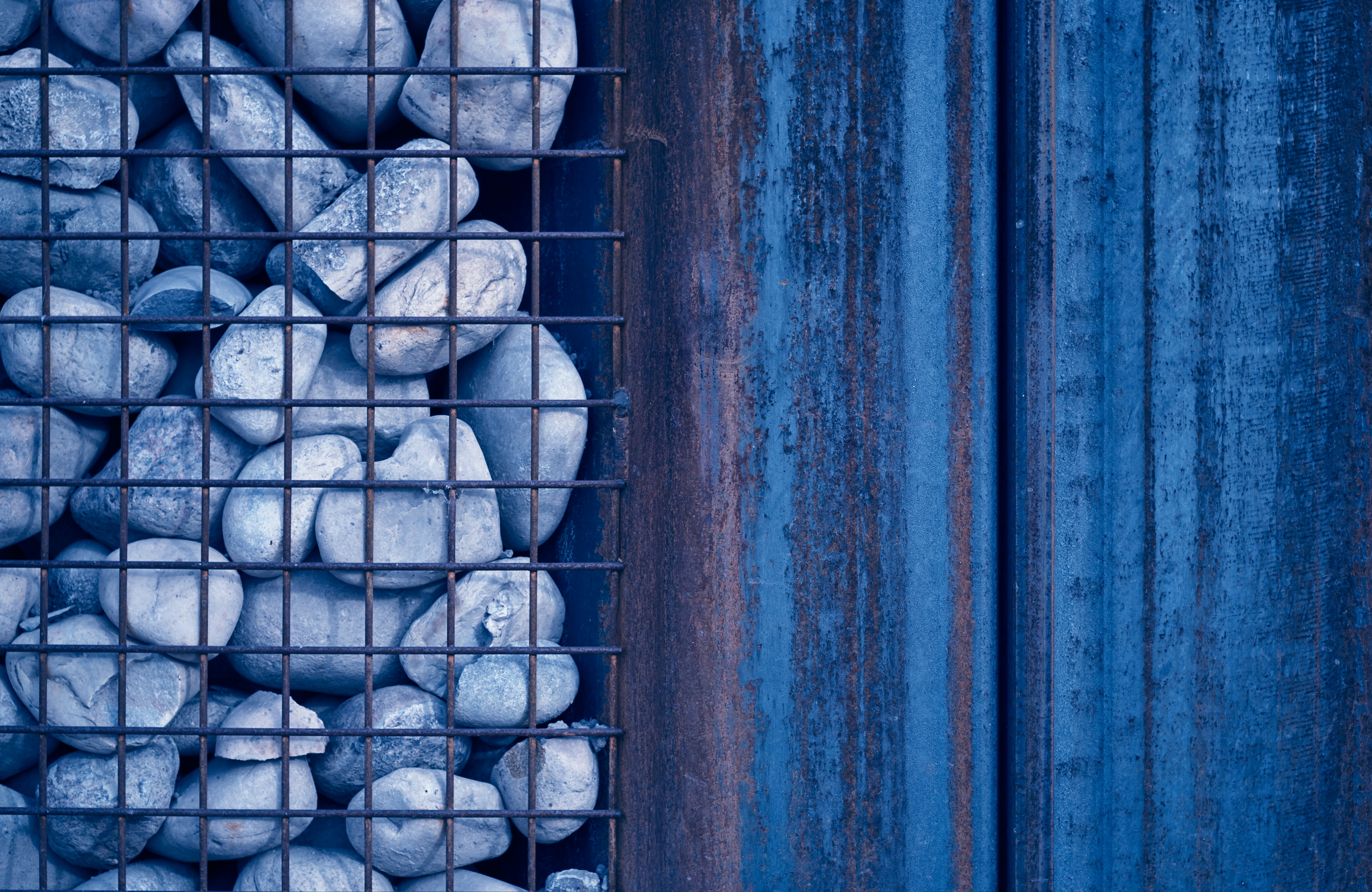 Blue Grid of Stones: Industrial Texture in Steel-Blue Tones