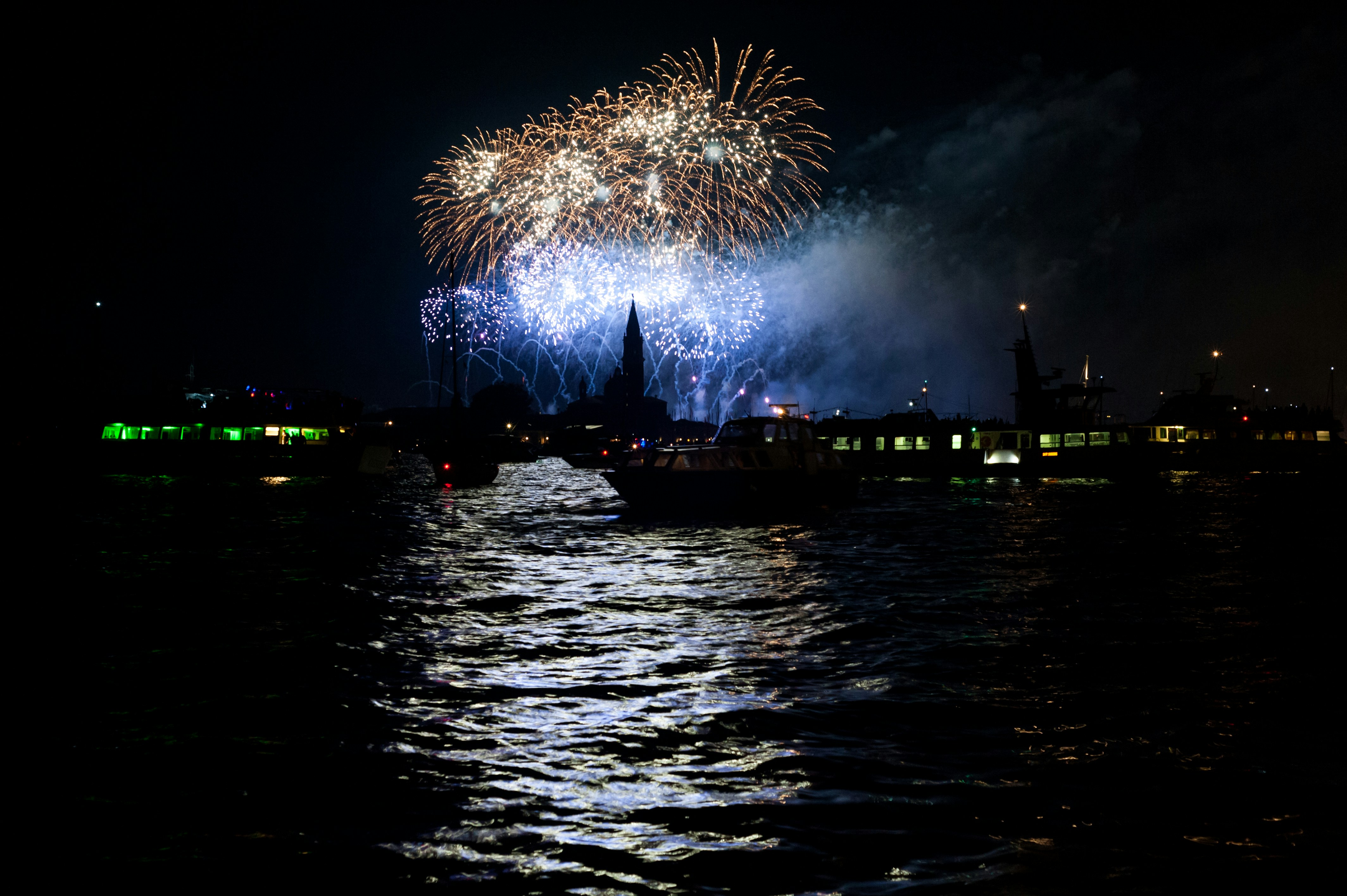 Midnight Constellation over the River: Fireworks Reflections