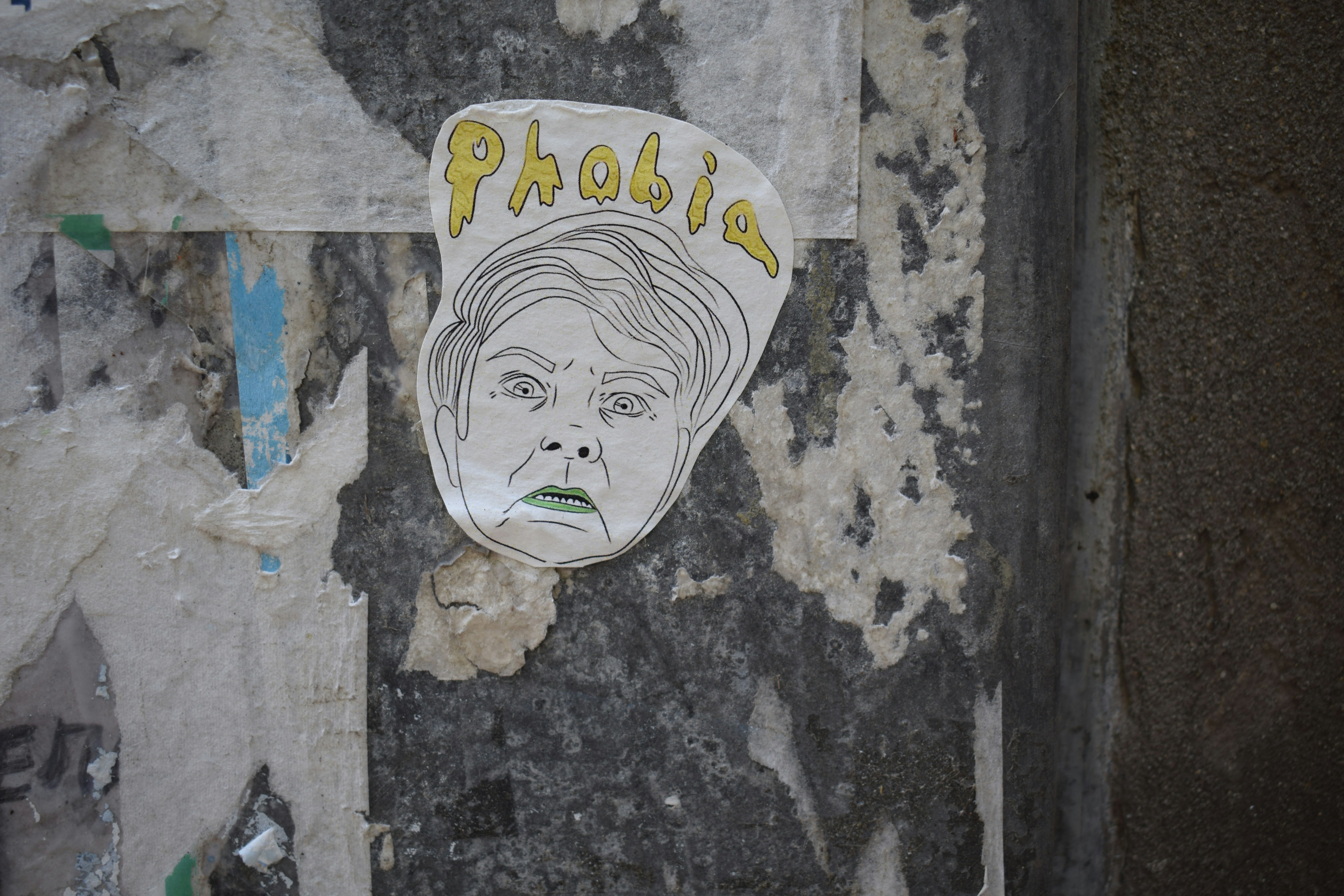 Drawing of man on a sticker photo – Free Grey Image on Unsplash