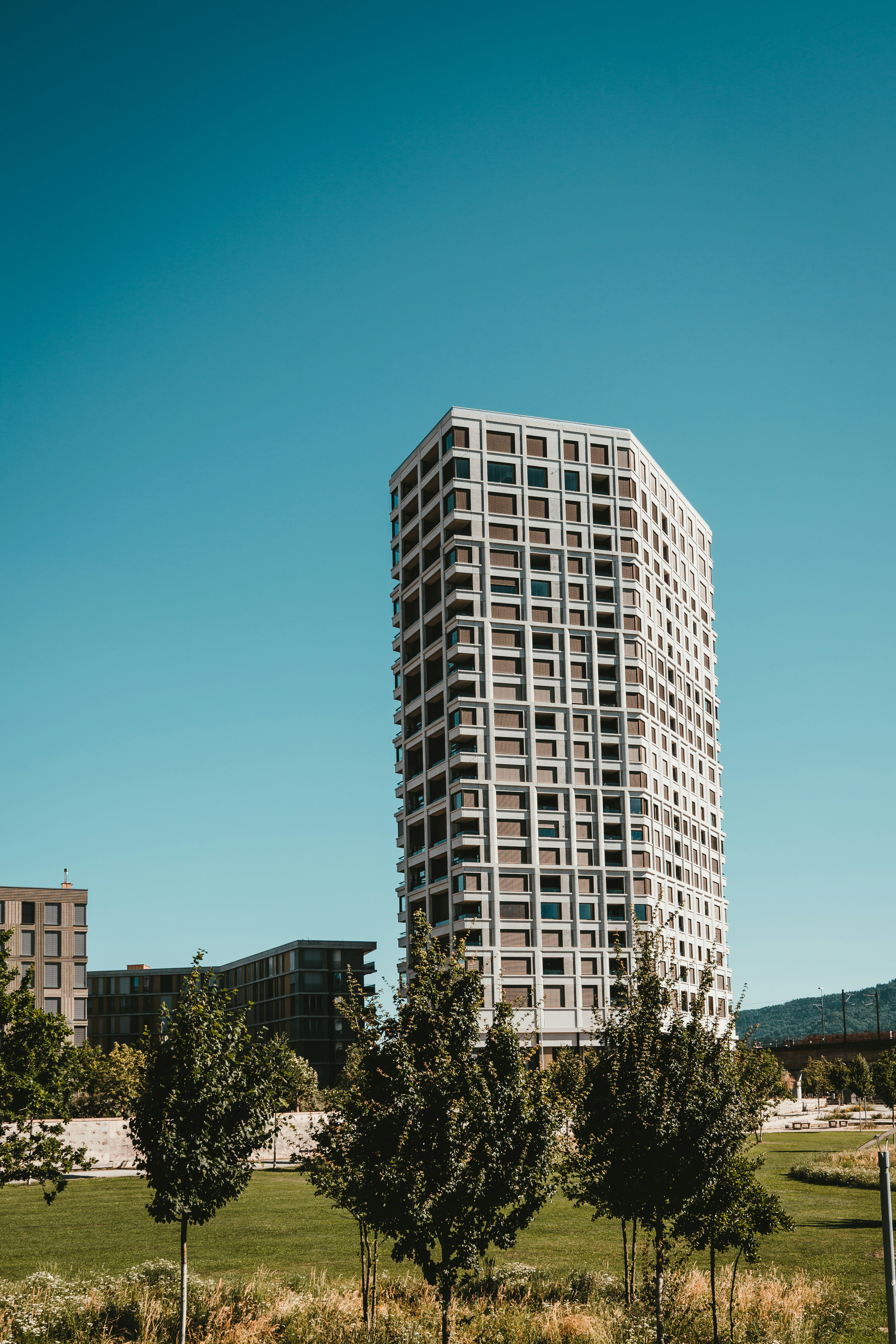 White high-rise building photo – Free Pfingstweidstrasse 85 Image on ...