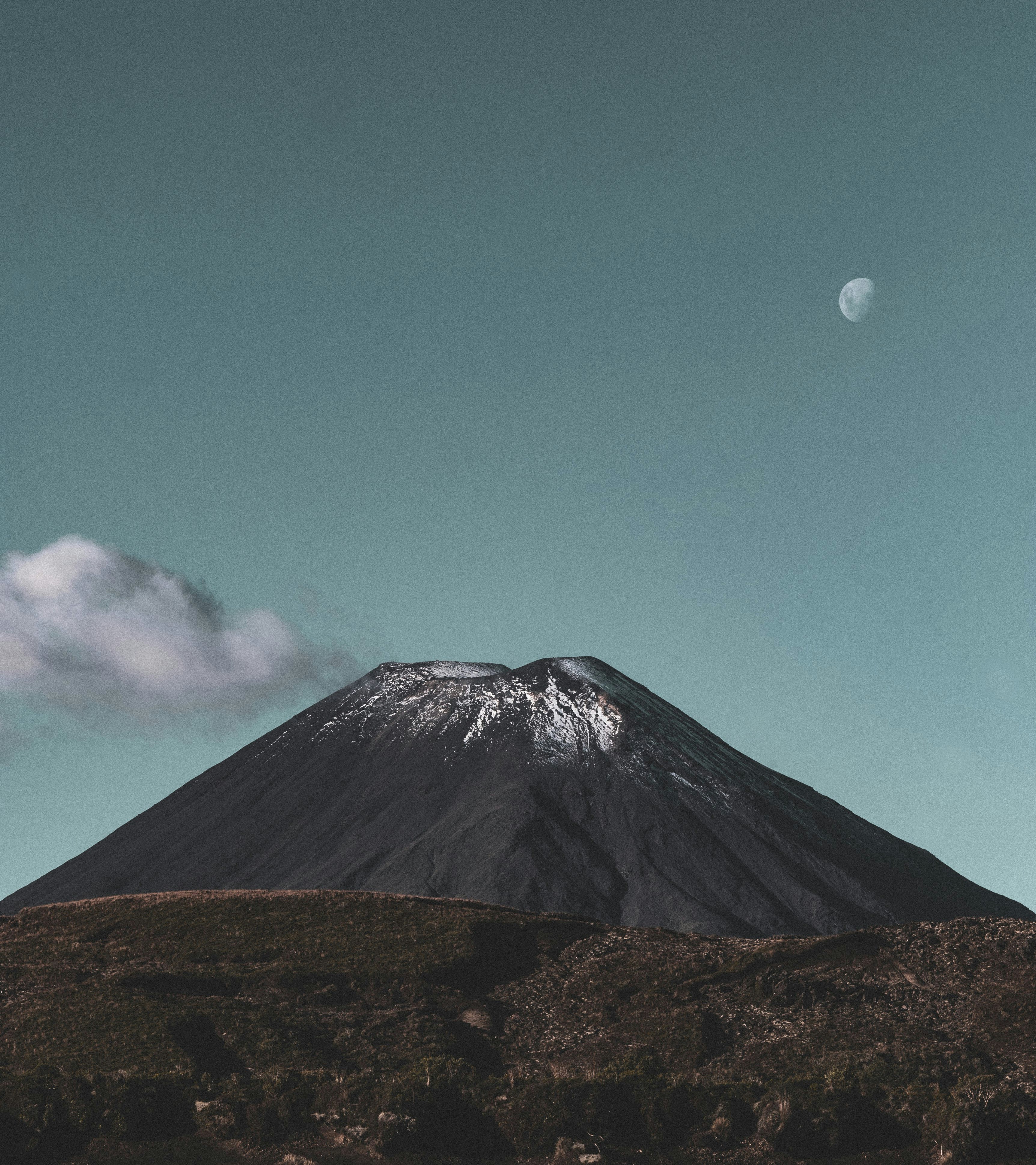snow-covered mountain under blue sky
