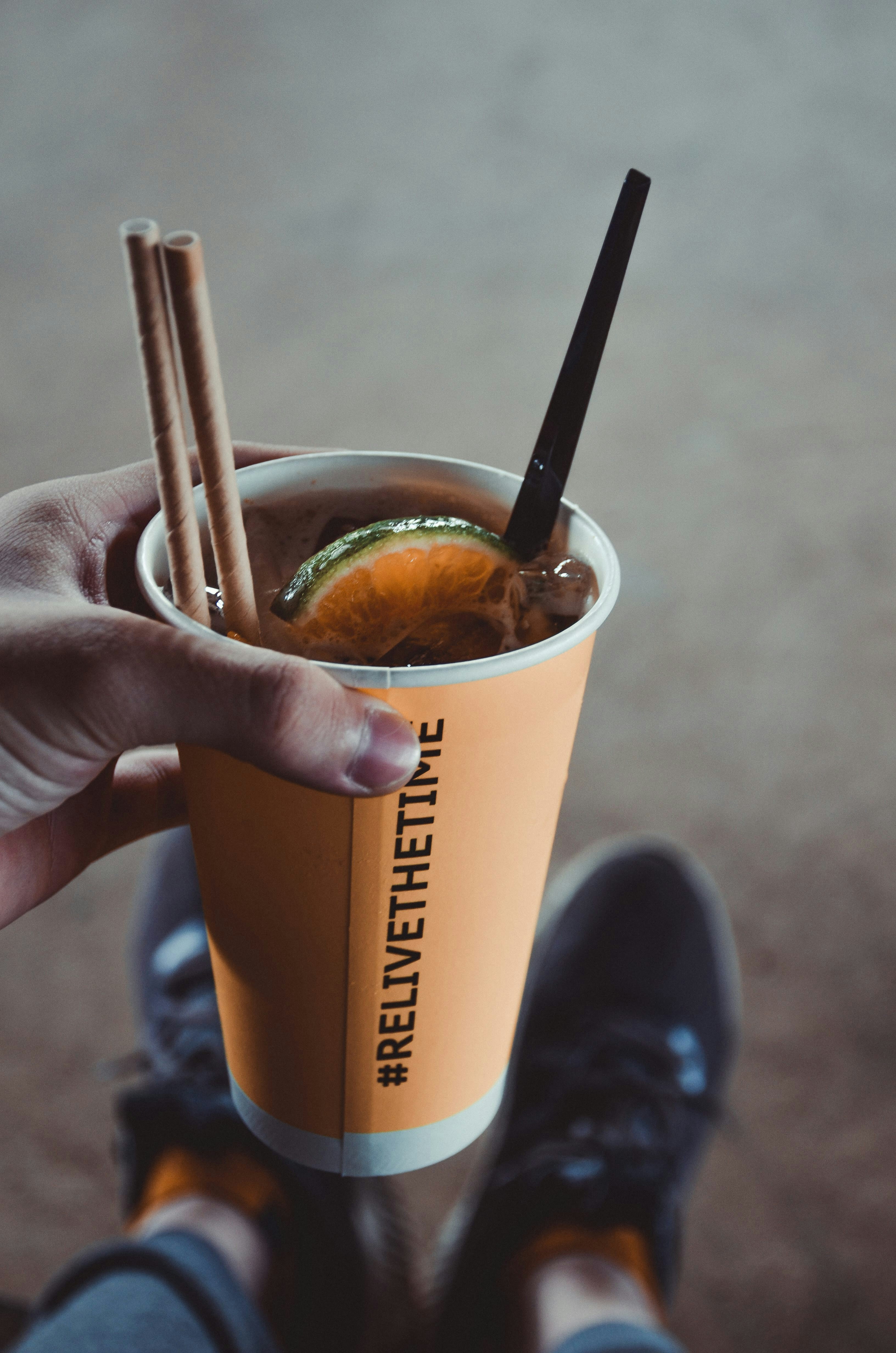 Orange Cup Pause: A Citrus-Fresh Moment Between Steps