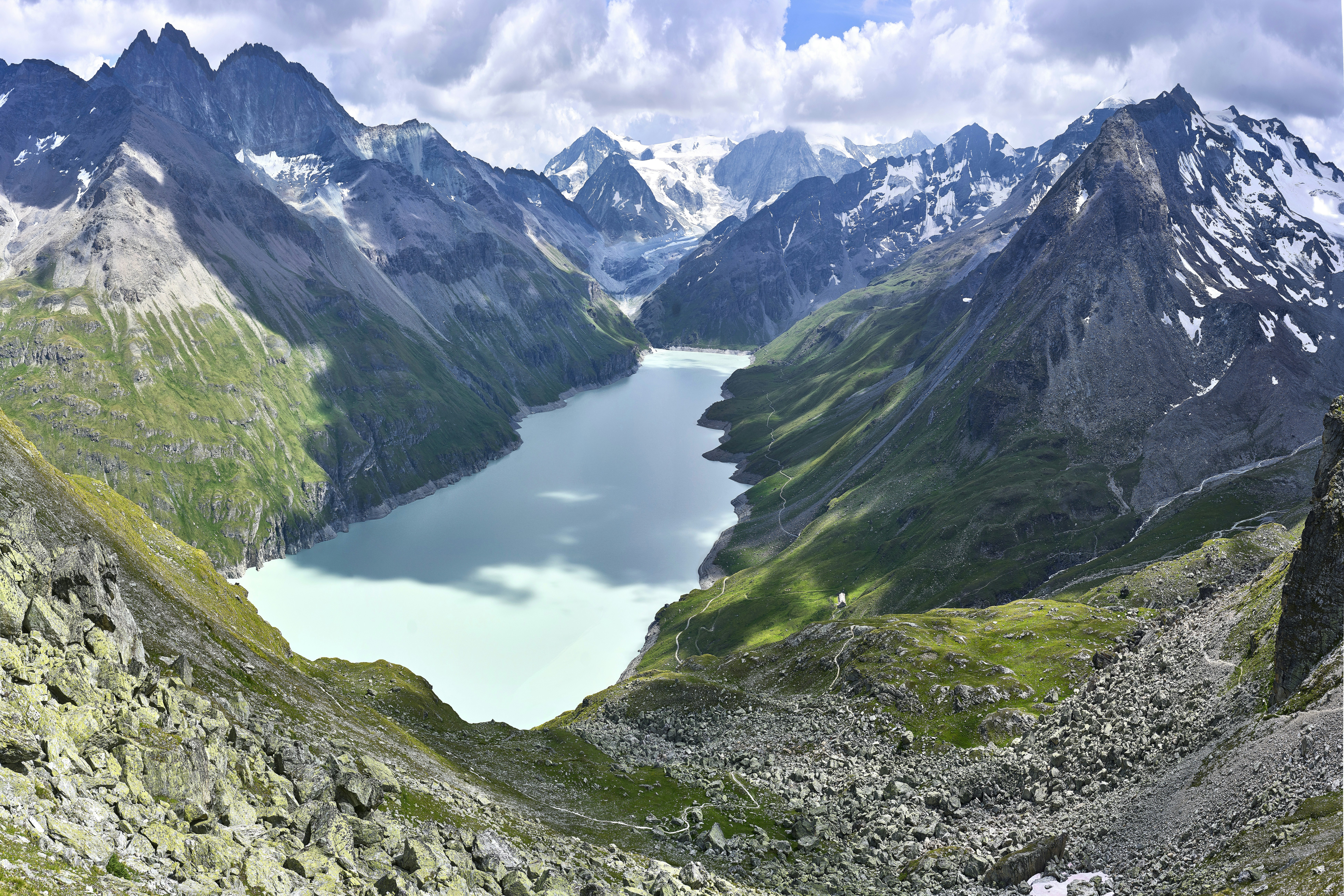 Aerial photography of lake between mountain range during daytime photo ...
