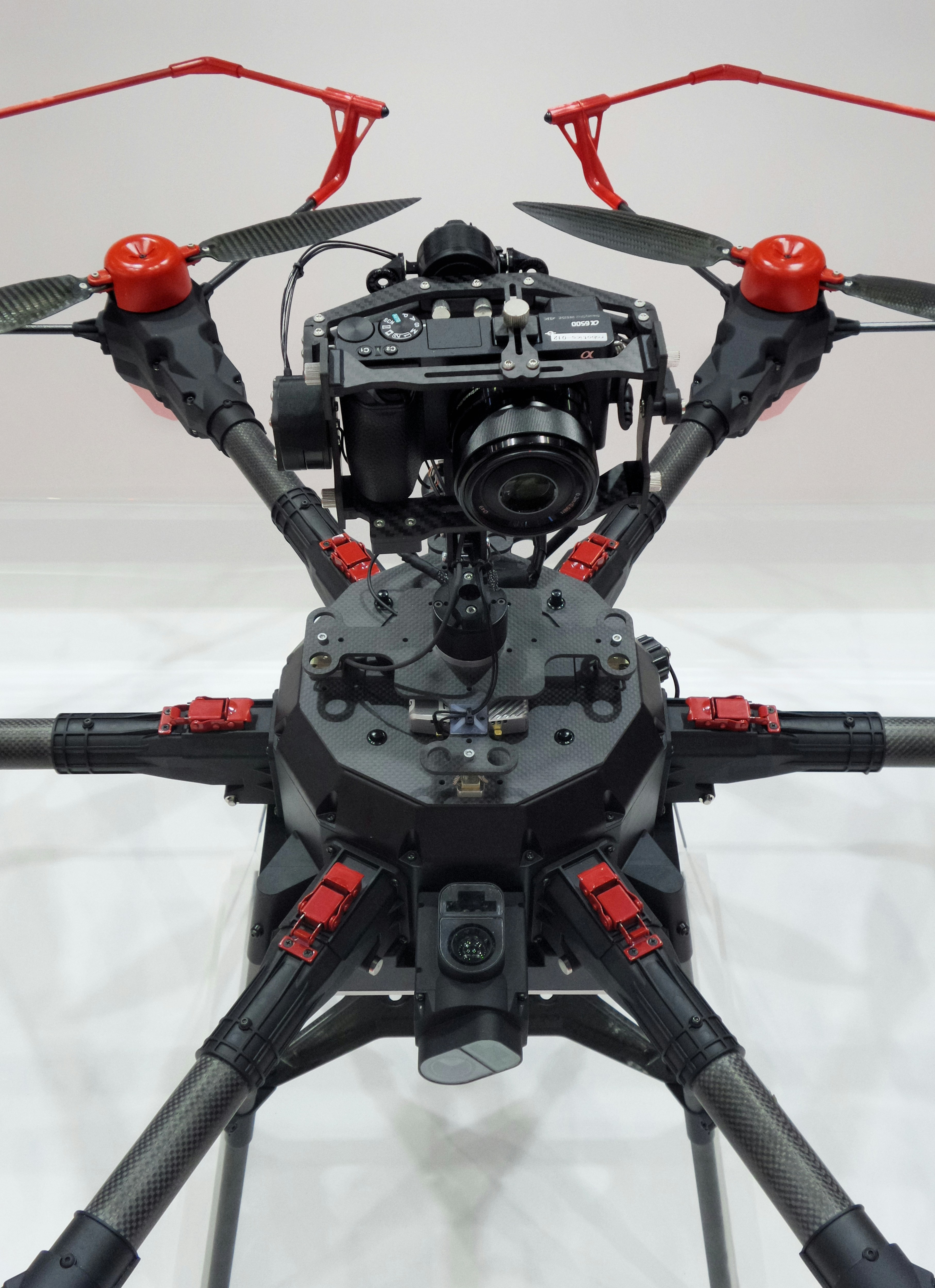 Close-up view of a drone equipped with a camera, showcasing its intricate design and advanced features.