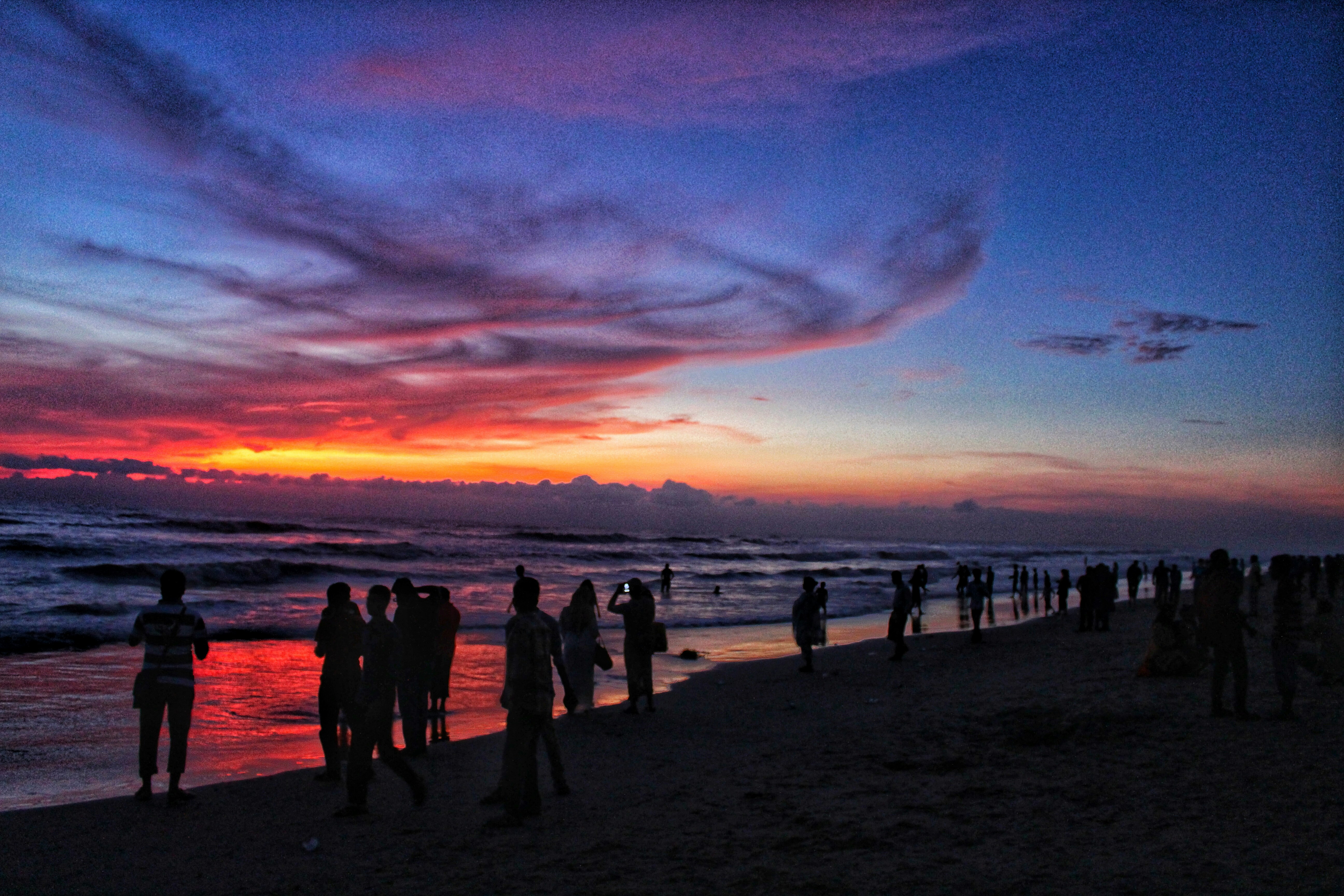 Silhouette of people standing beside seashore photo – Free Human Image ...
