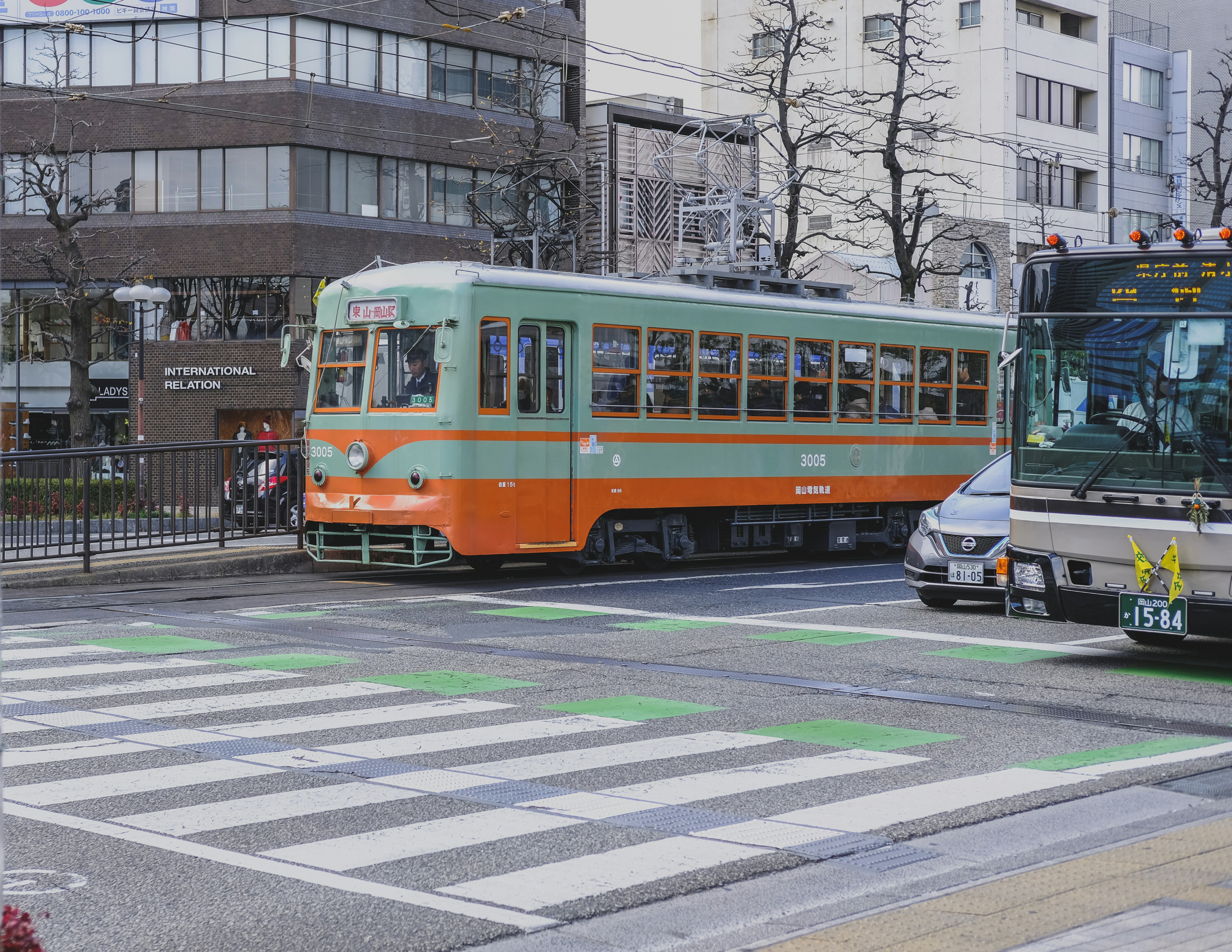 Orange and teal bus photo – Free Japan Image on Unsplash