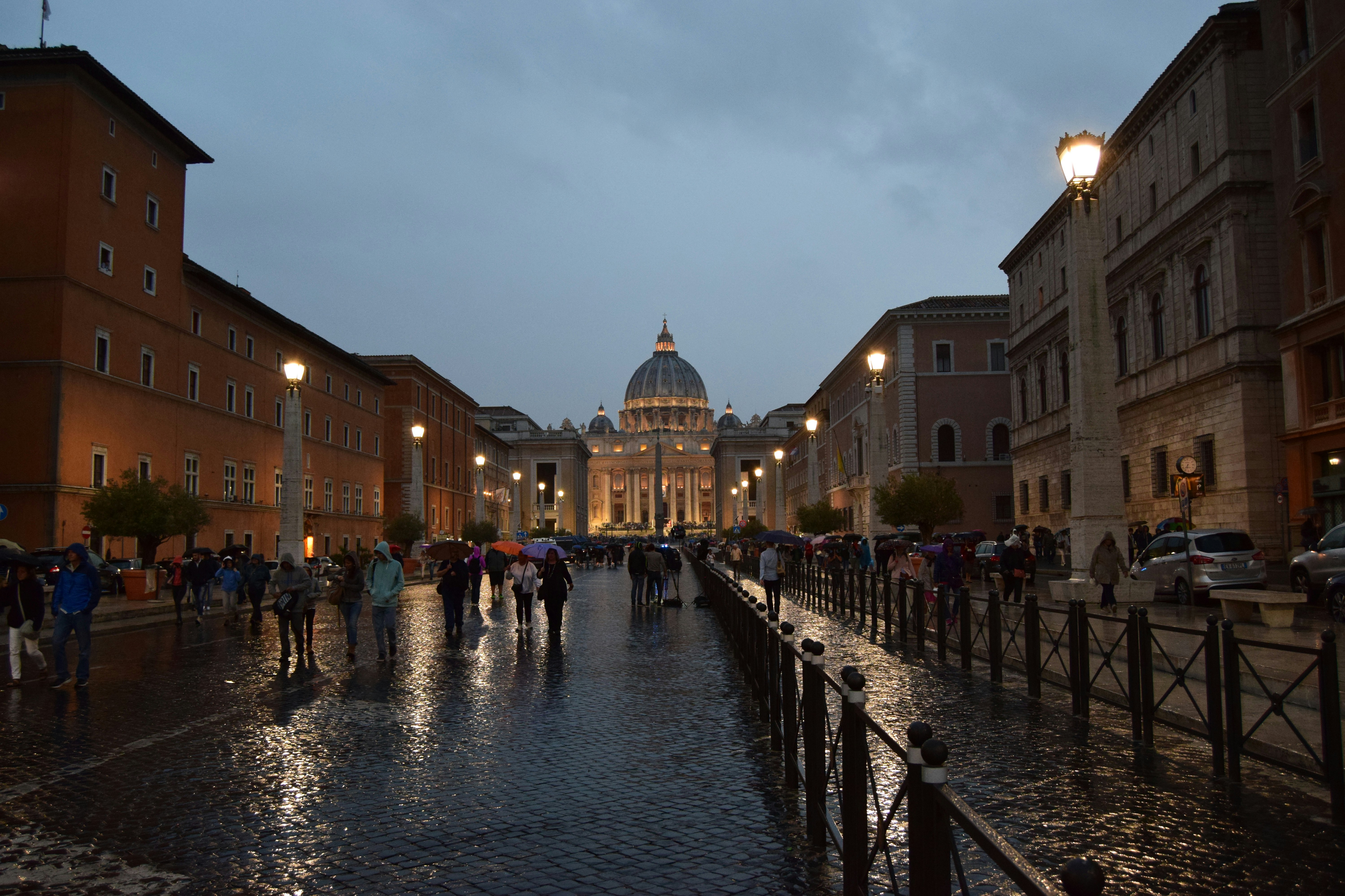 Rain-Kissed Rome: Lanterns, Umbrellas, and the Dome