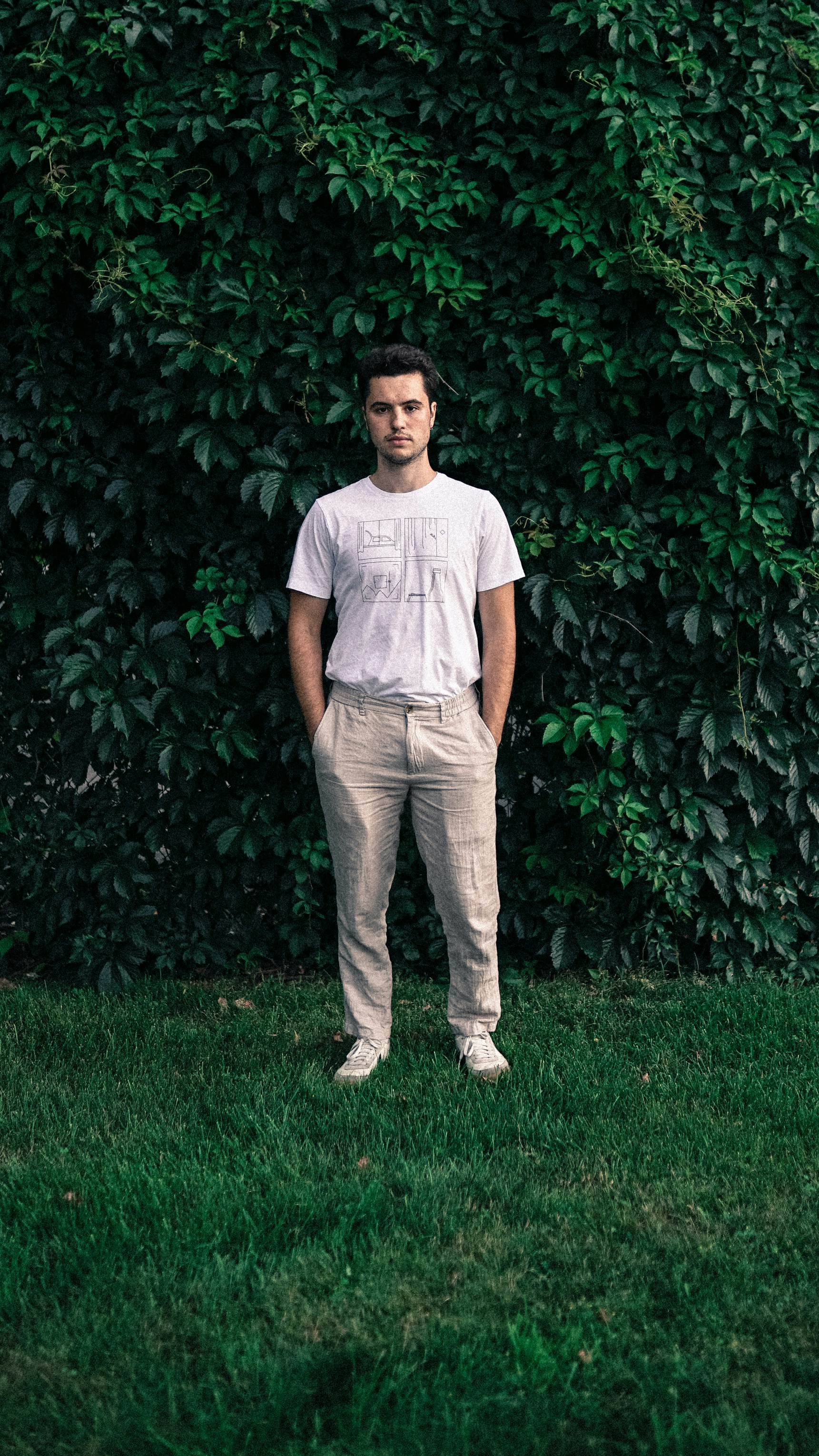 Centered Portrait Against a Velvet Ivy Backdrop