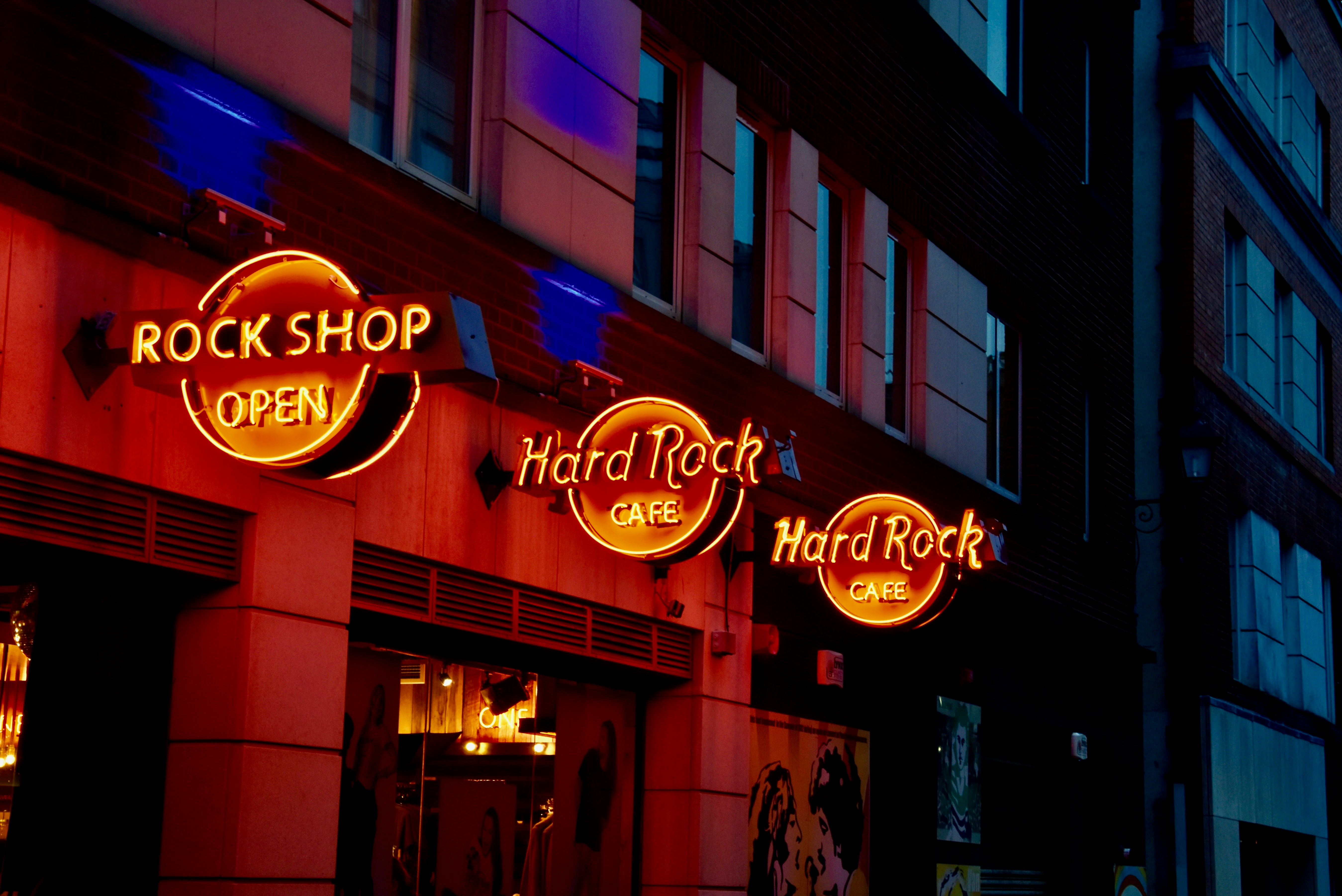 Neon Cadence Along the Night Facade: Rock Shop and Hard Rock Café