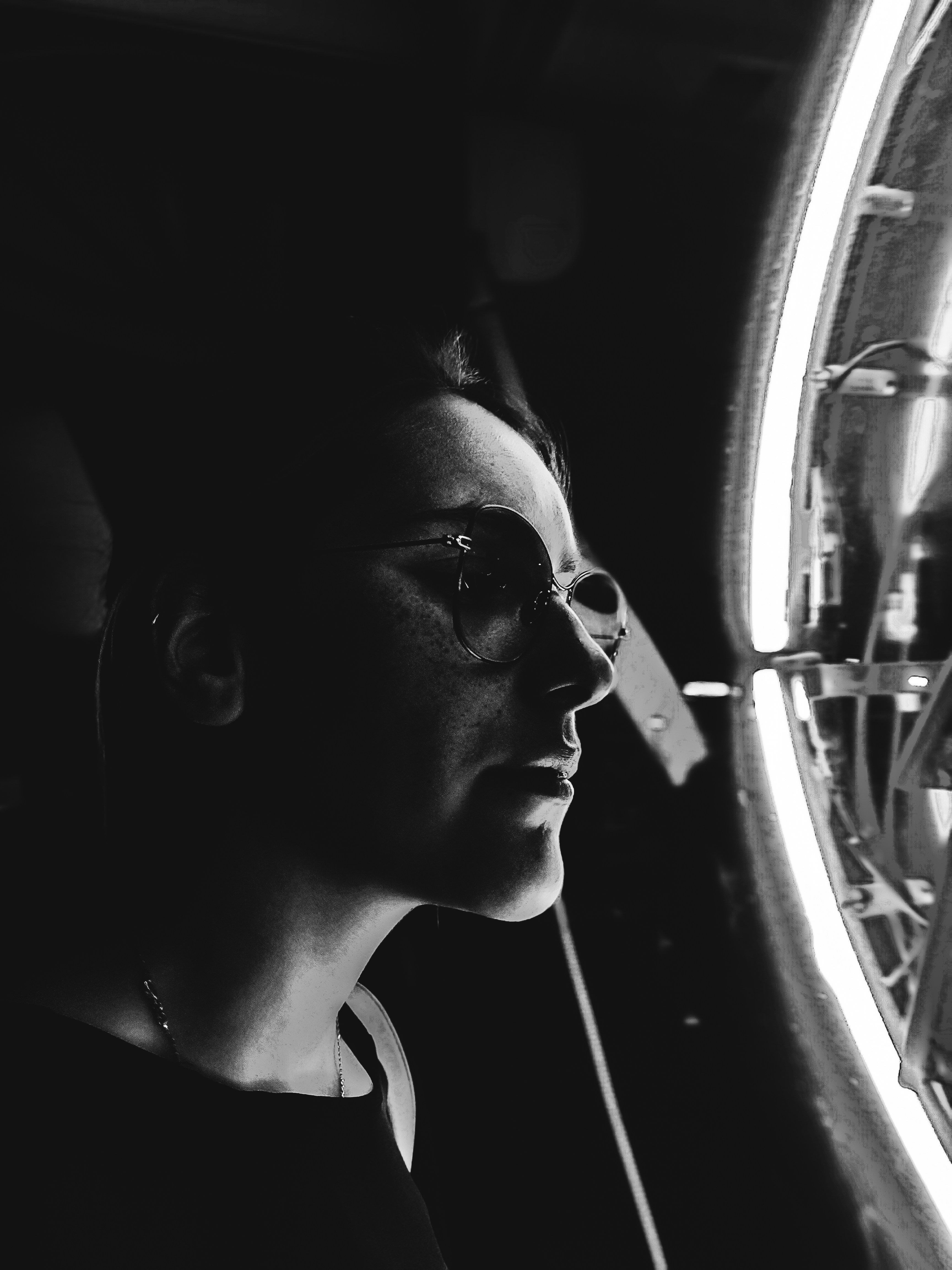 Neon Gaze in the Quiet Carriage