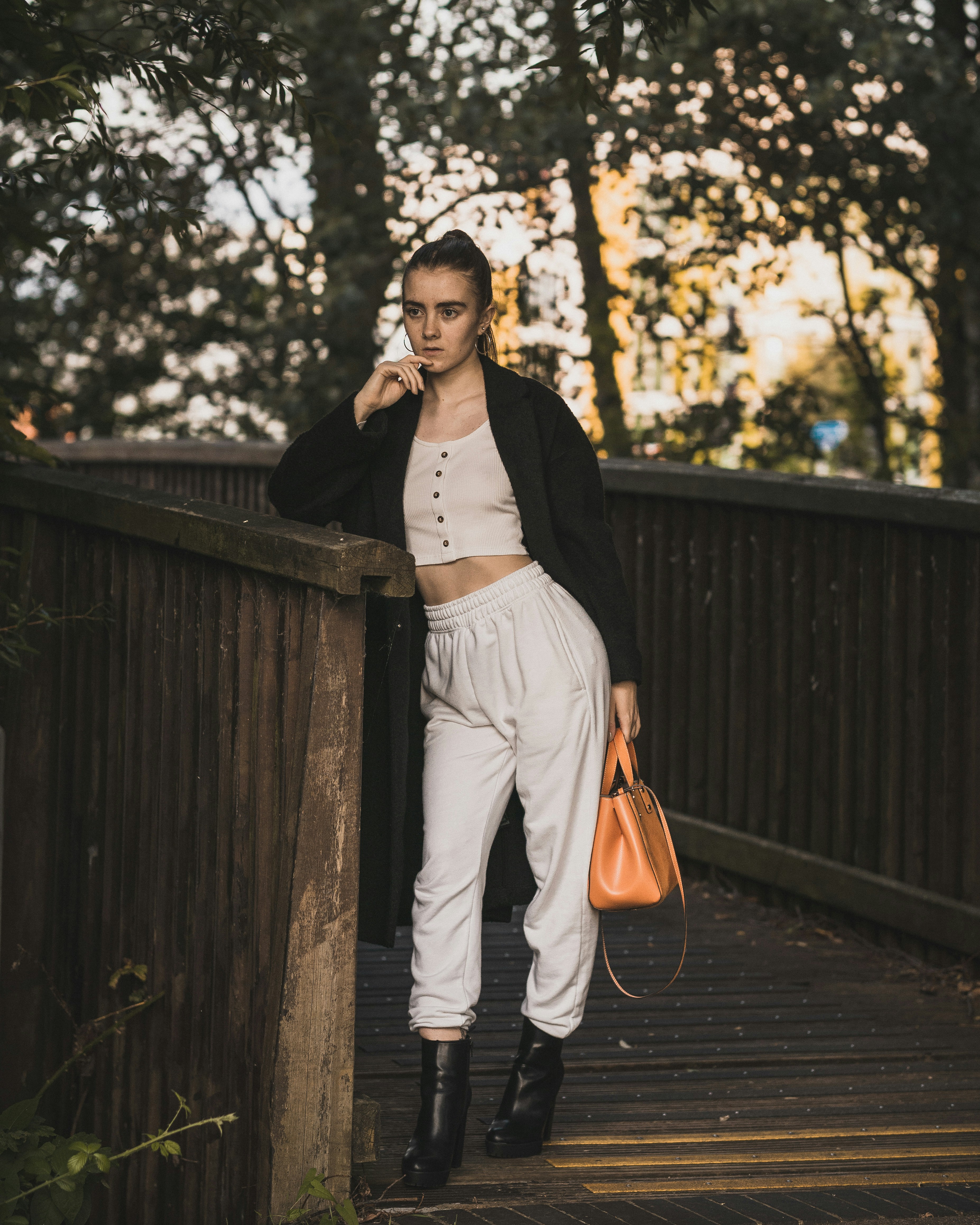 Woman leaning on railing fashion photography photo – Free Human Image ...