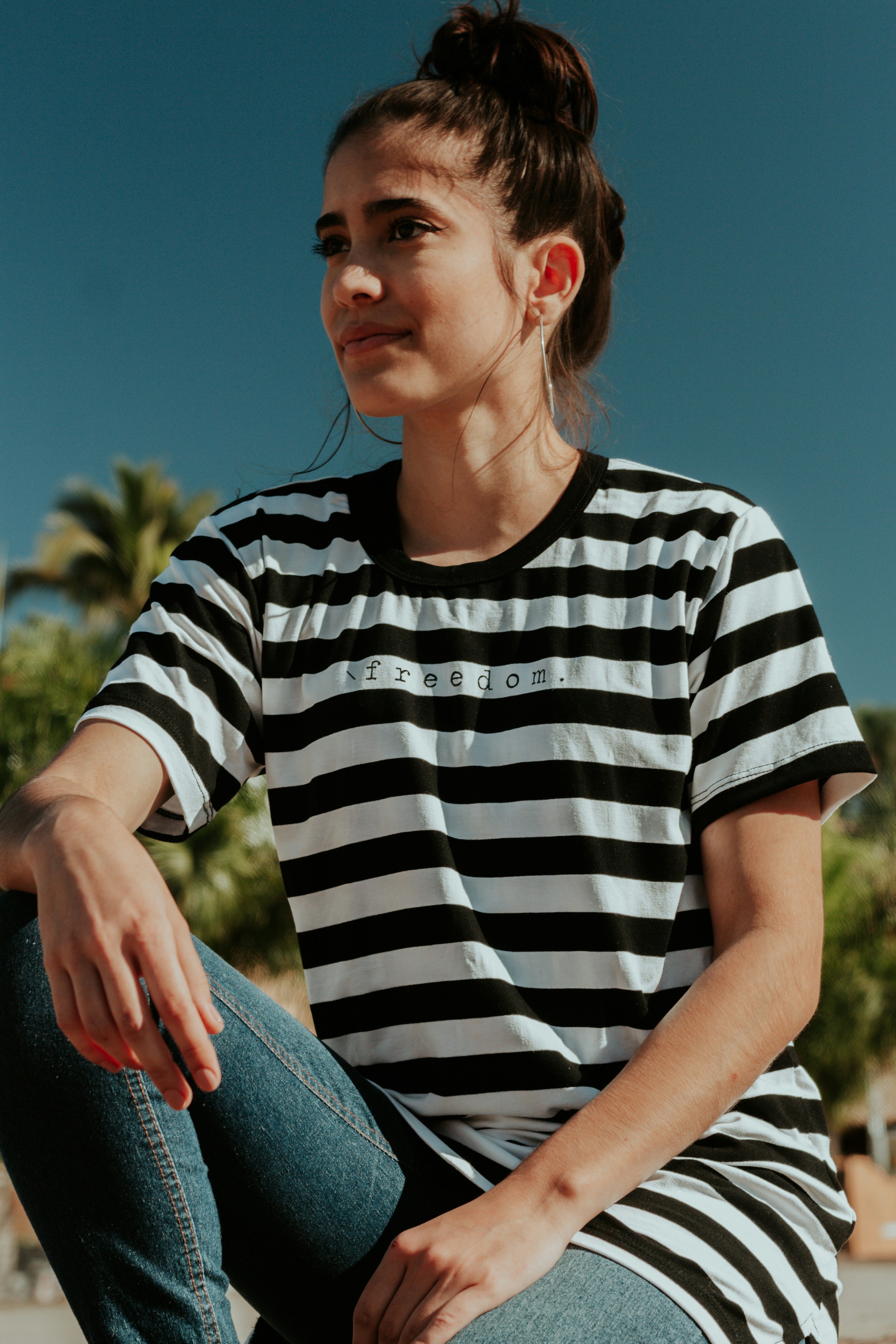 Coastal Light in Stripes: A Portrait of Quiet Confidence
