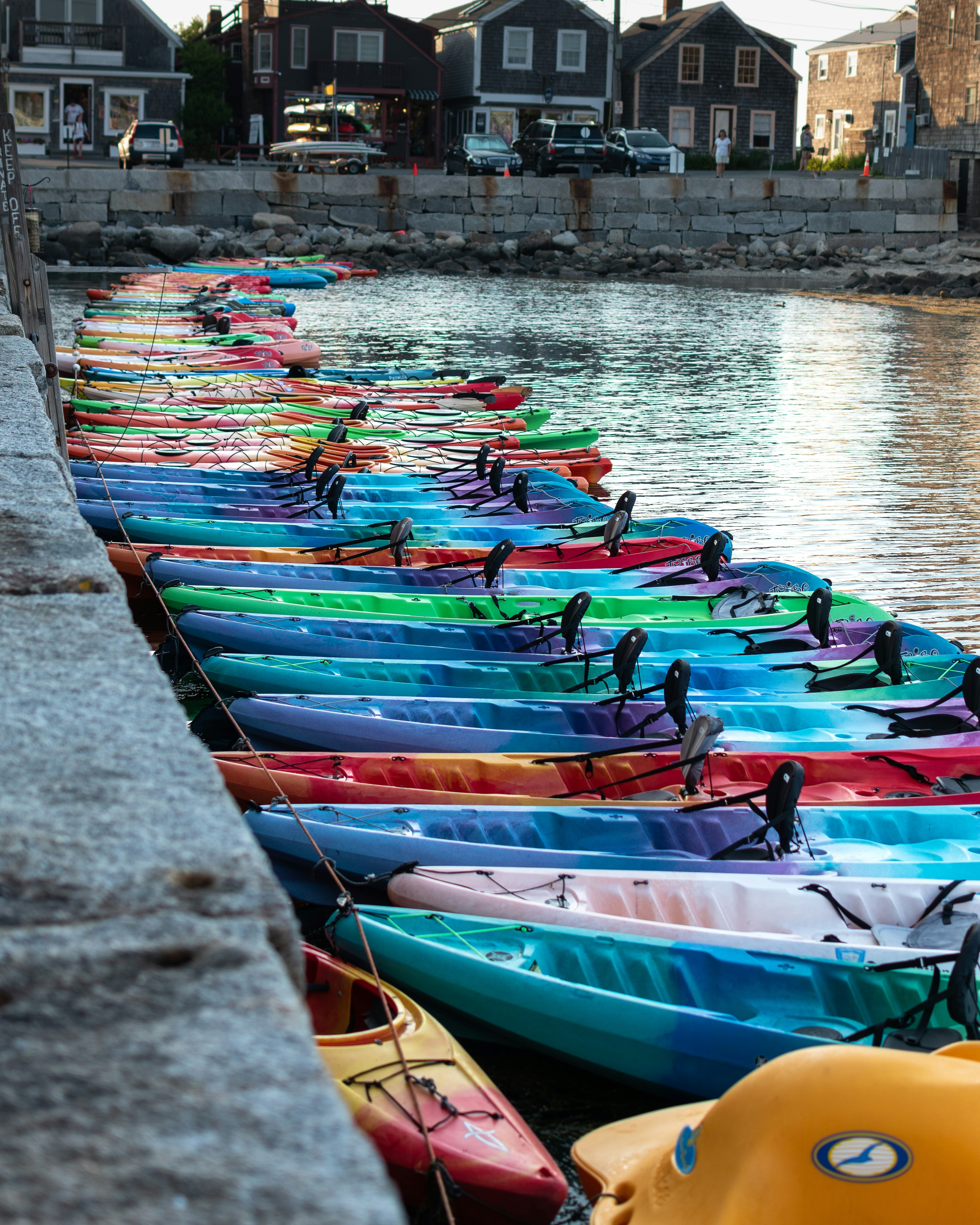 Assorted-color plastic kayaks on sea photo – Free Kayaks Image on Unsplash