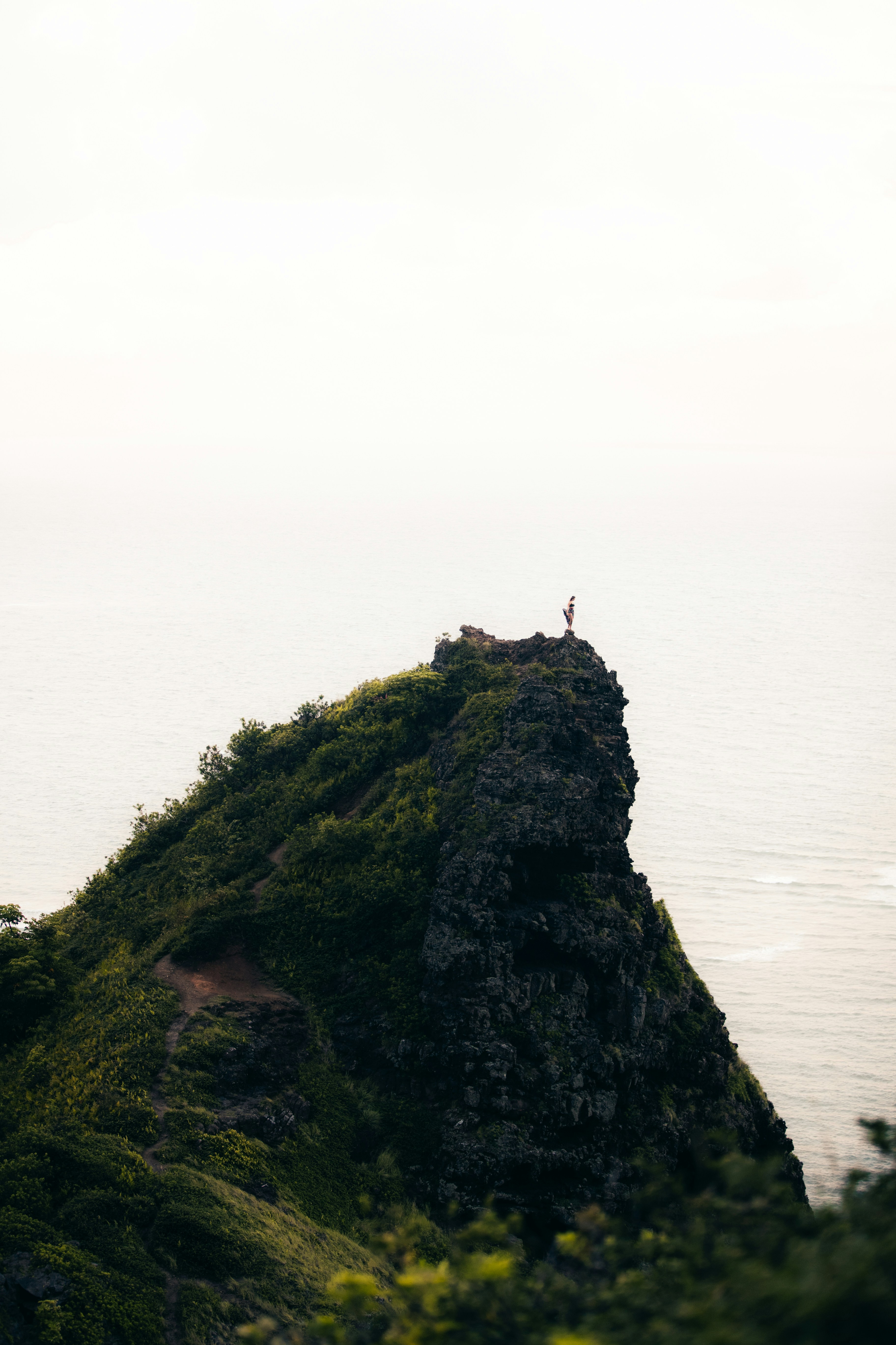 Sea beside mountain photo – Free Hawaii Image on Unsplash