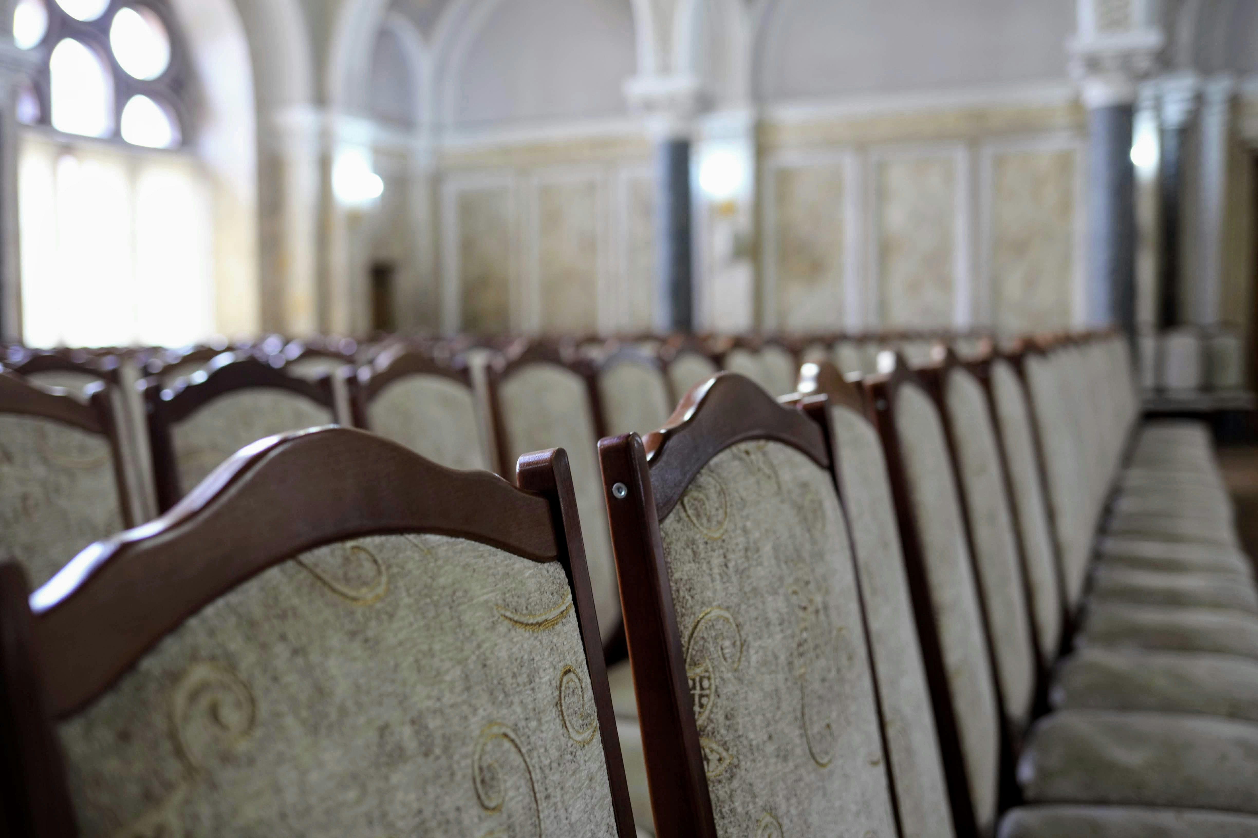 Echoes of Anticipation: A Hall Awaiting Assembly