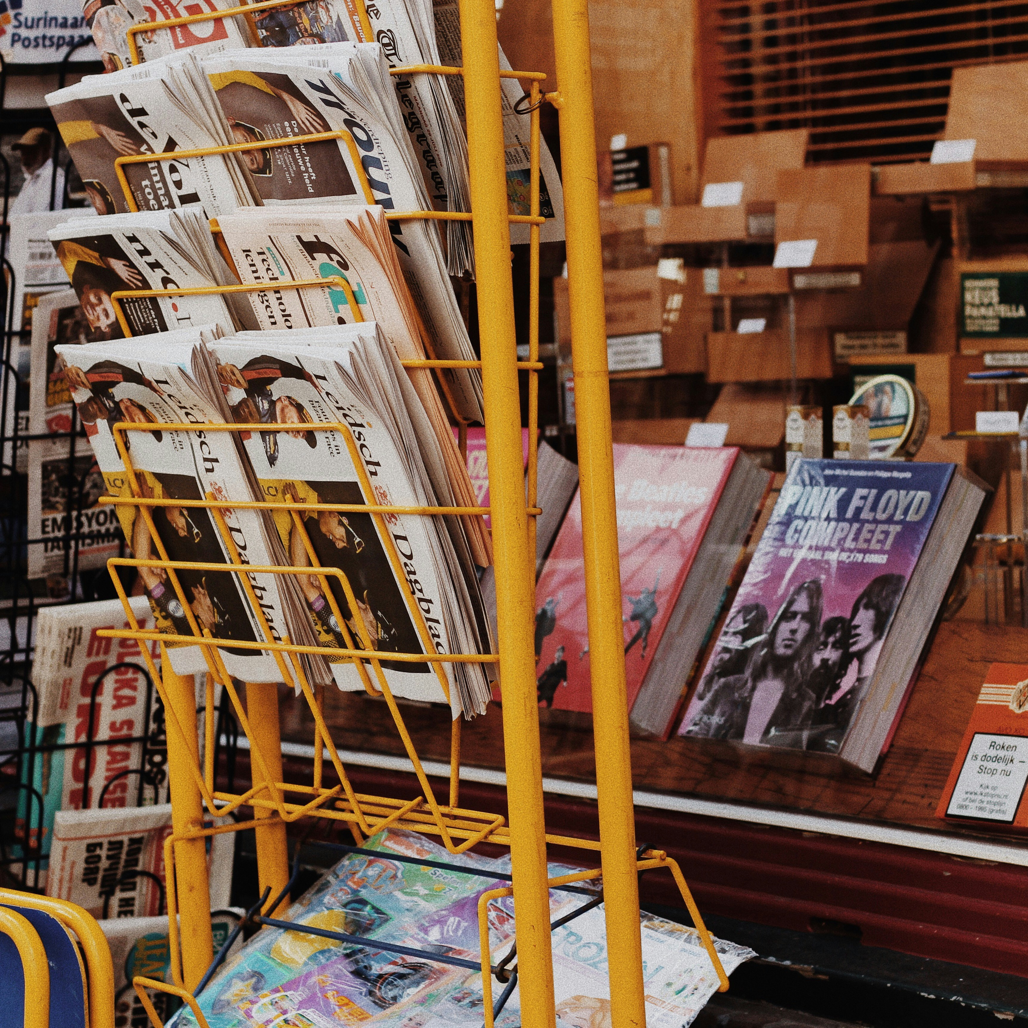 Yellow-Railed Newsstand with Rock Guitar Magazine on Display