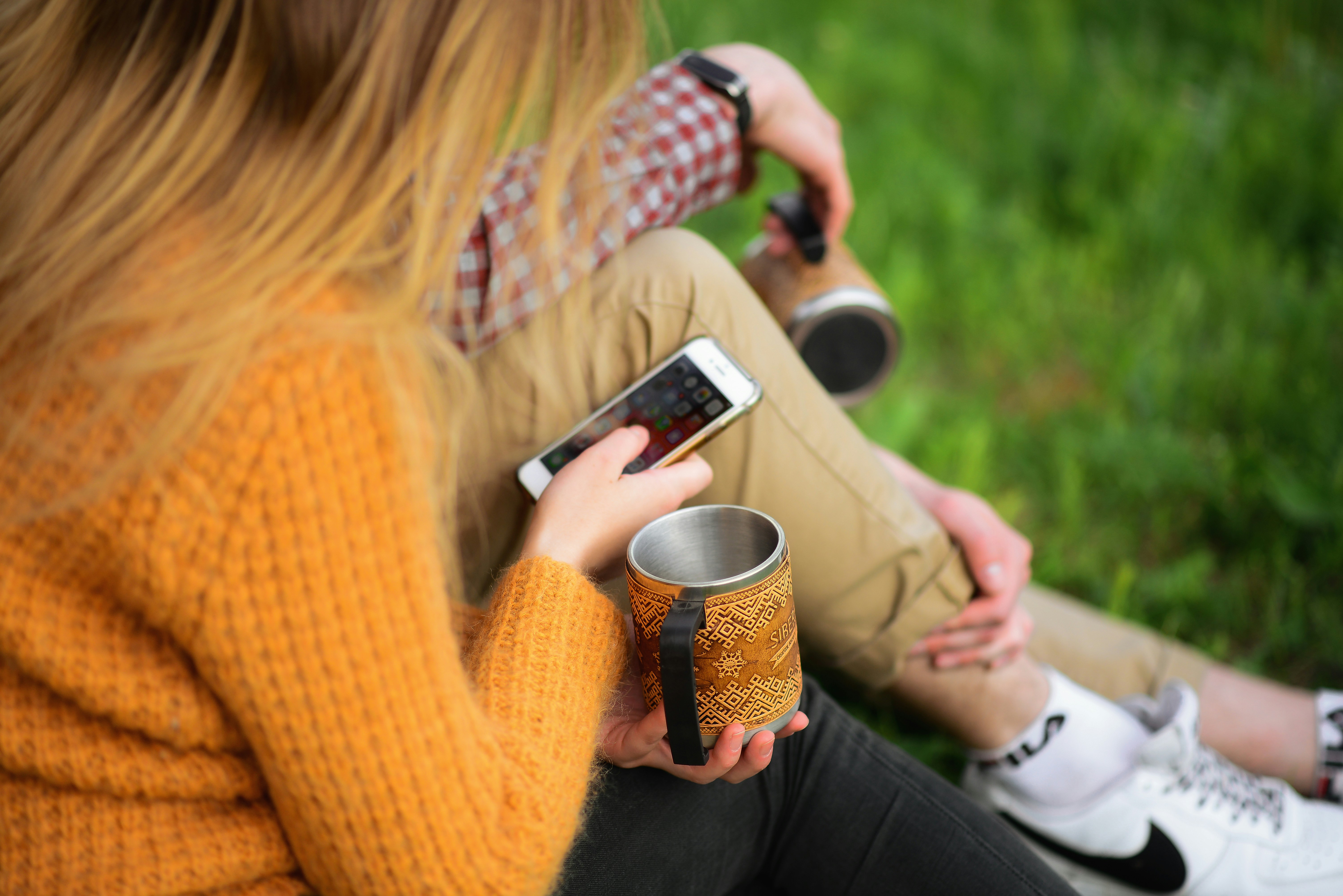 Woman using smartphone photo – Free Sandy lake Image on Unsplash