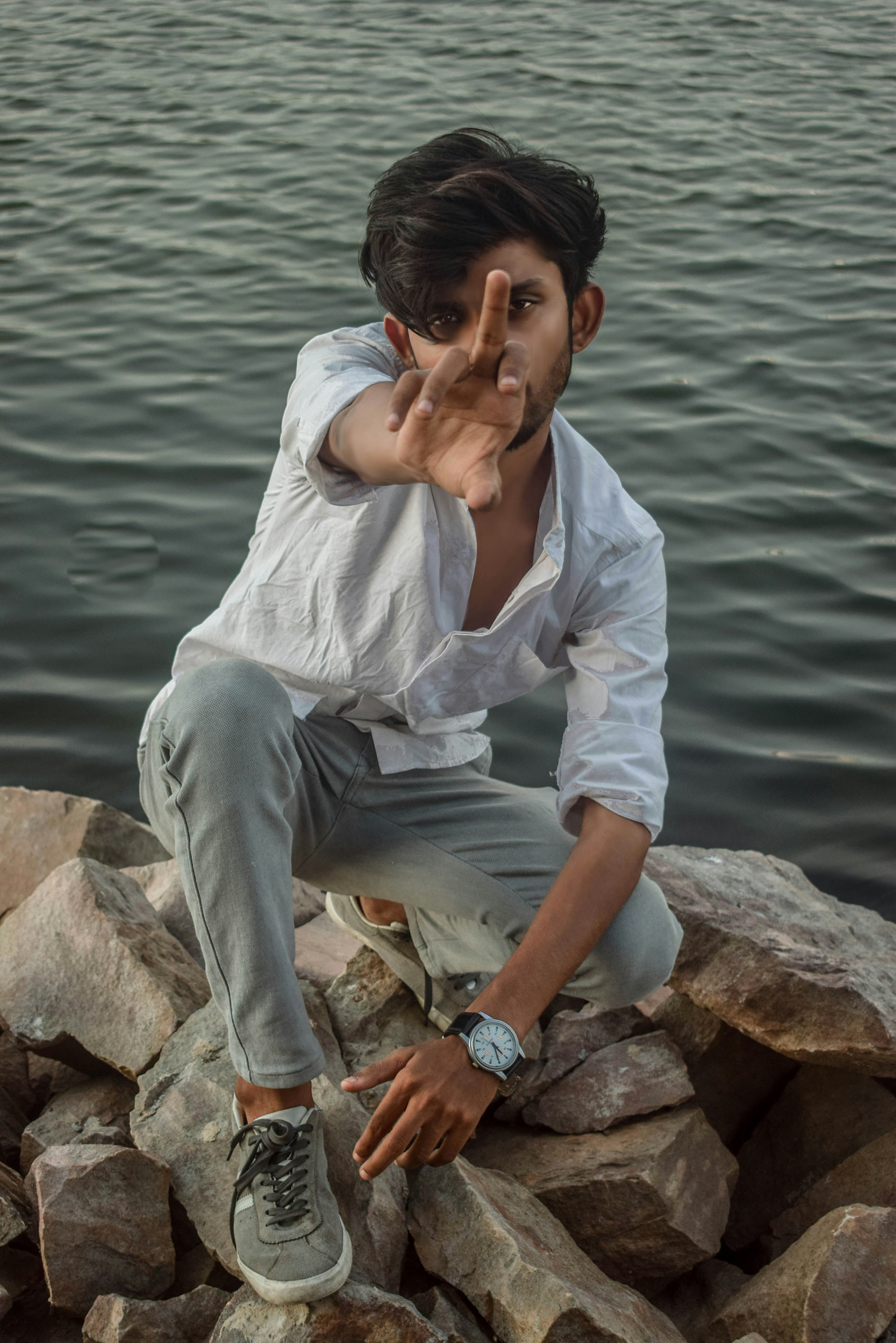 Man showing middle finger photo – Free Grey Image on Unsplash