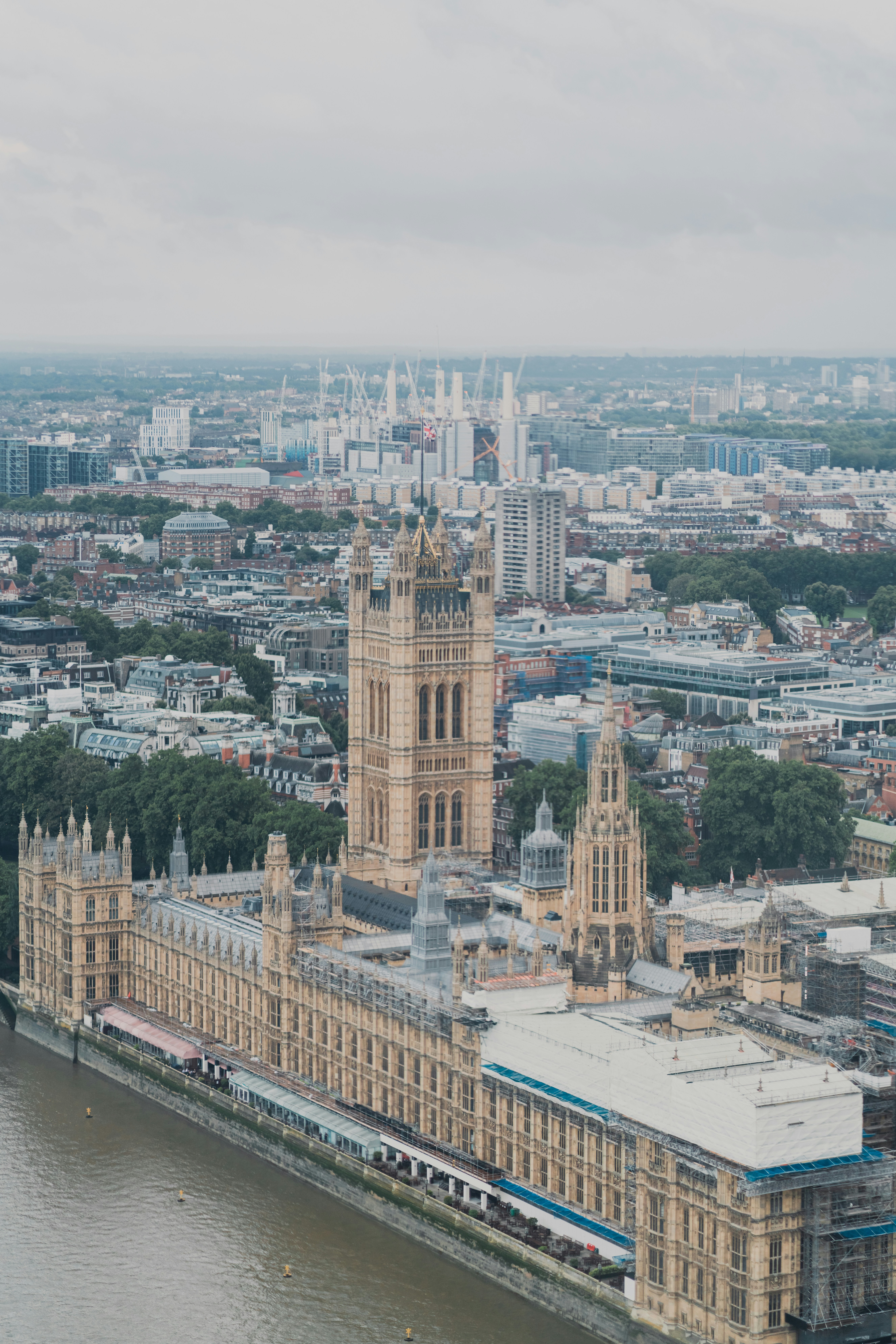 London's Riverfront Grandeur: Houses of Parliament from an Aerial View