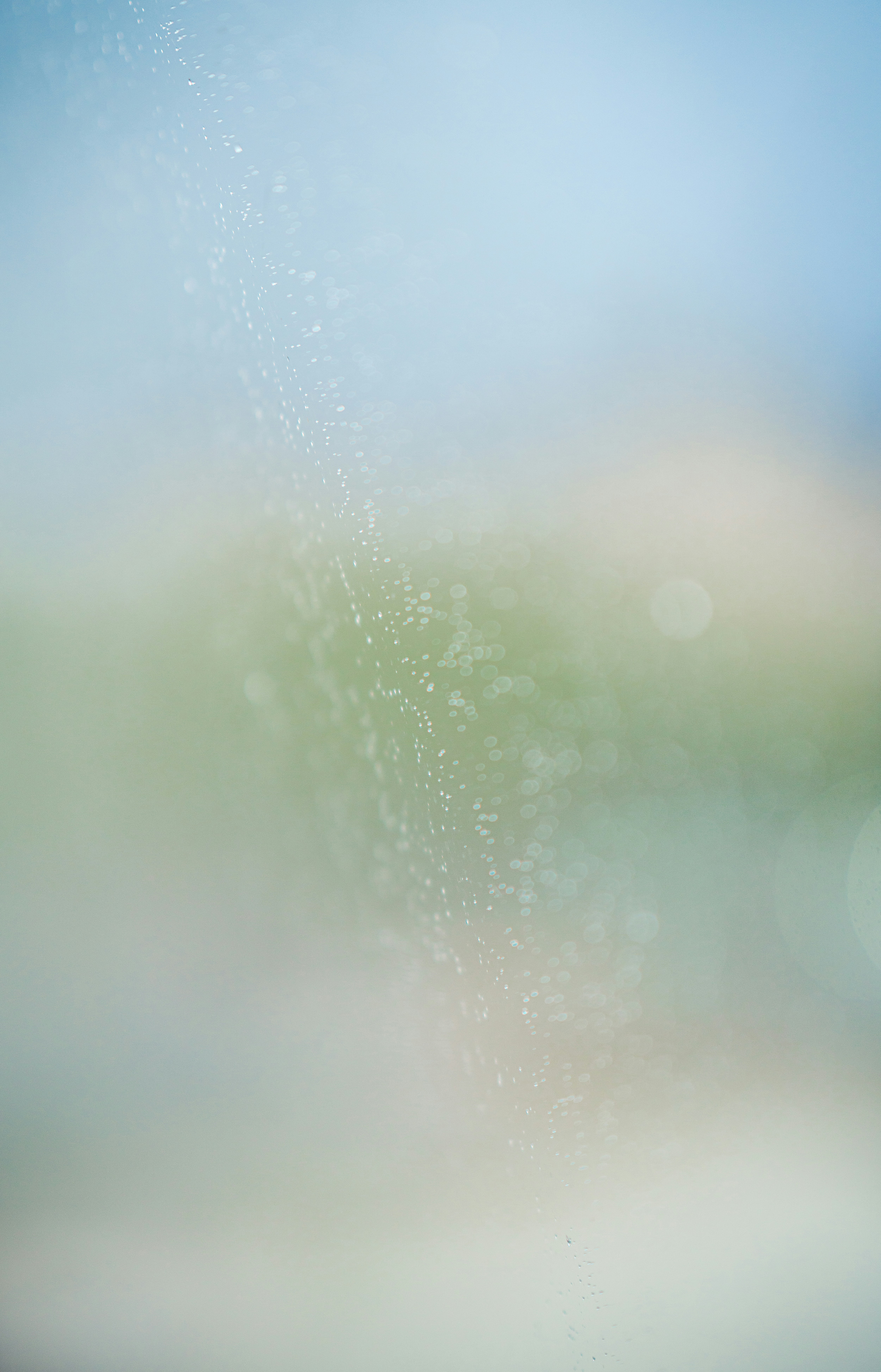 Rain Drops on the side of a London Eye capsule.
Perfect for a phone wallpaper.