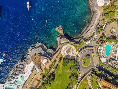Coastal Harmony: Aerial Serenity Over Blue Waters