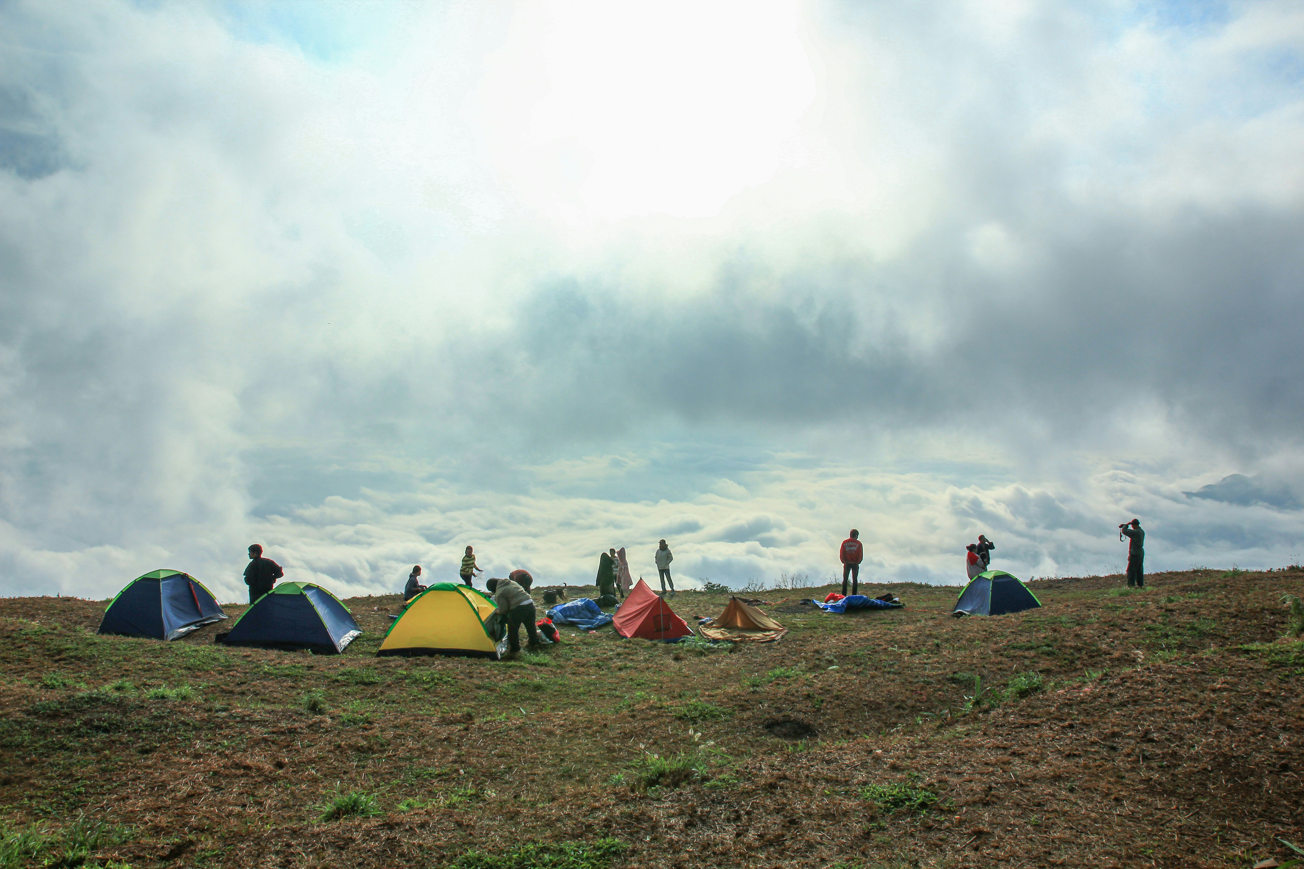 people camping on hill photo – Free Human Image on Unsplash