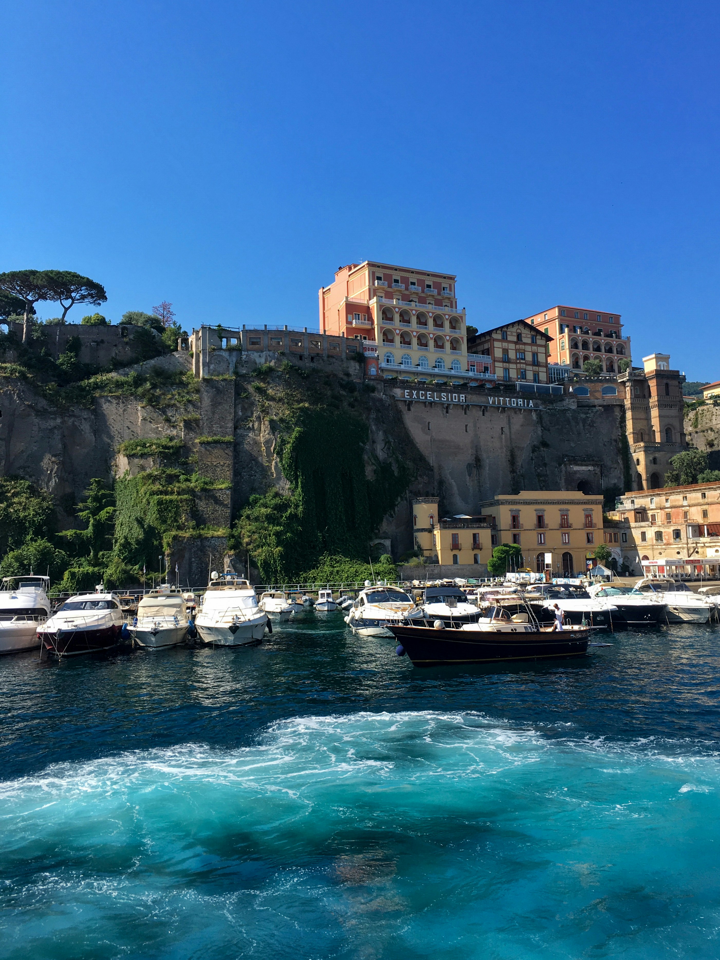 Clifftop Harbor Panorama: Boats at the Foot of the Excelsior Vittoria