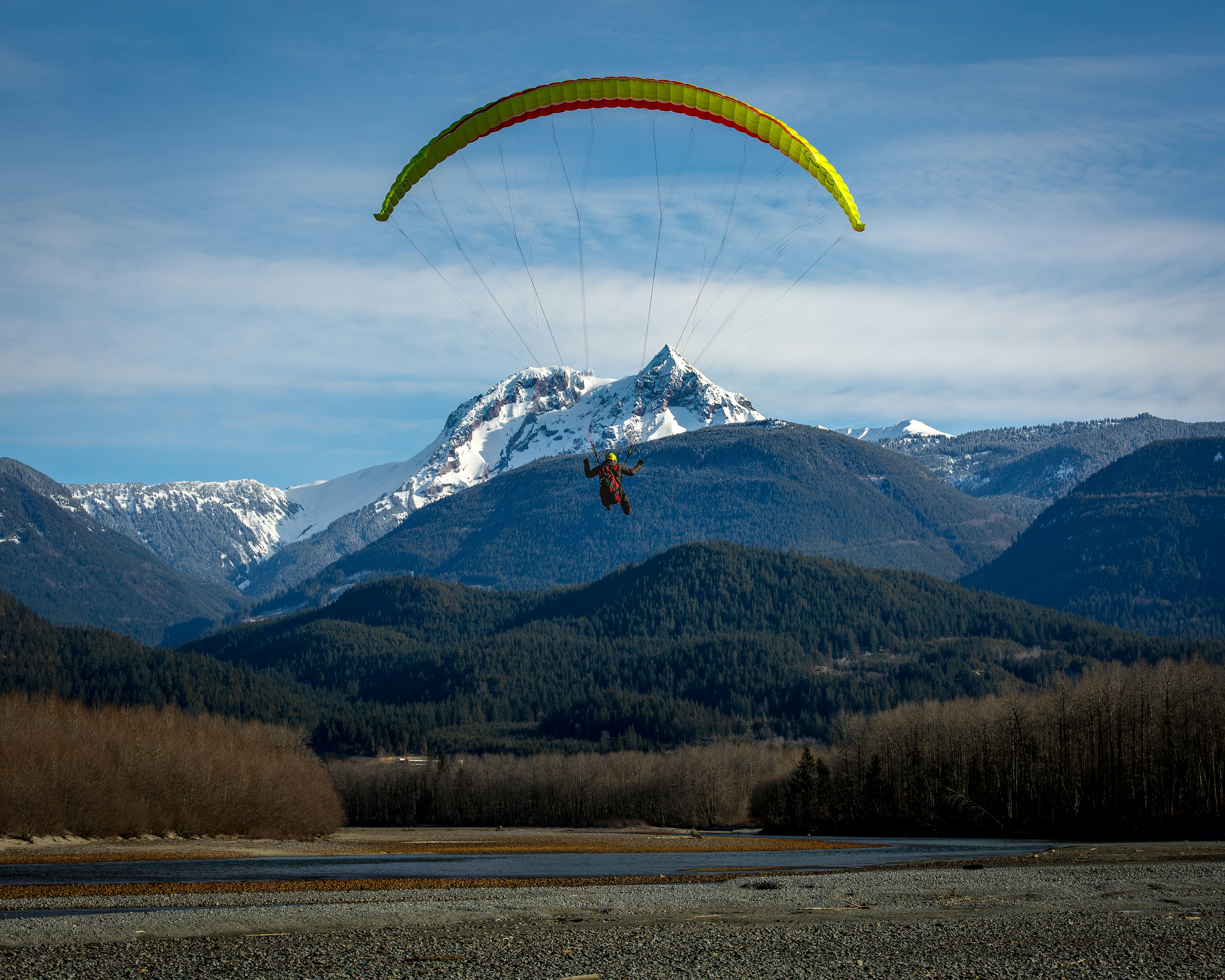 Paraglider with a mountain in the background.  