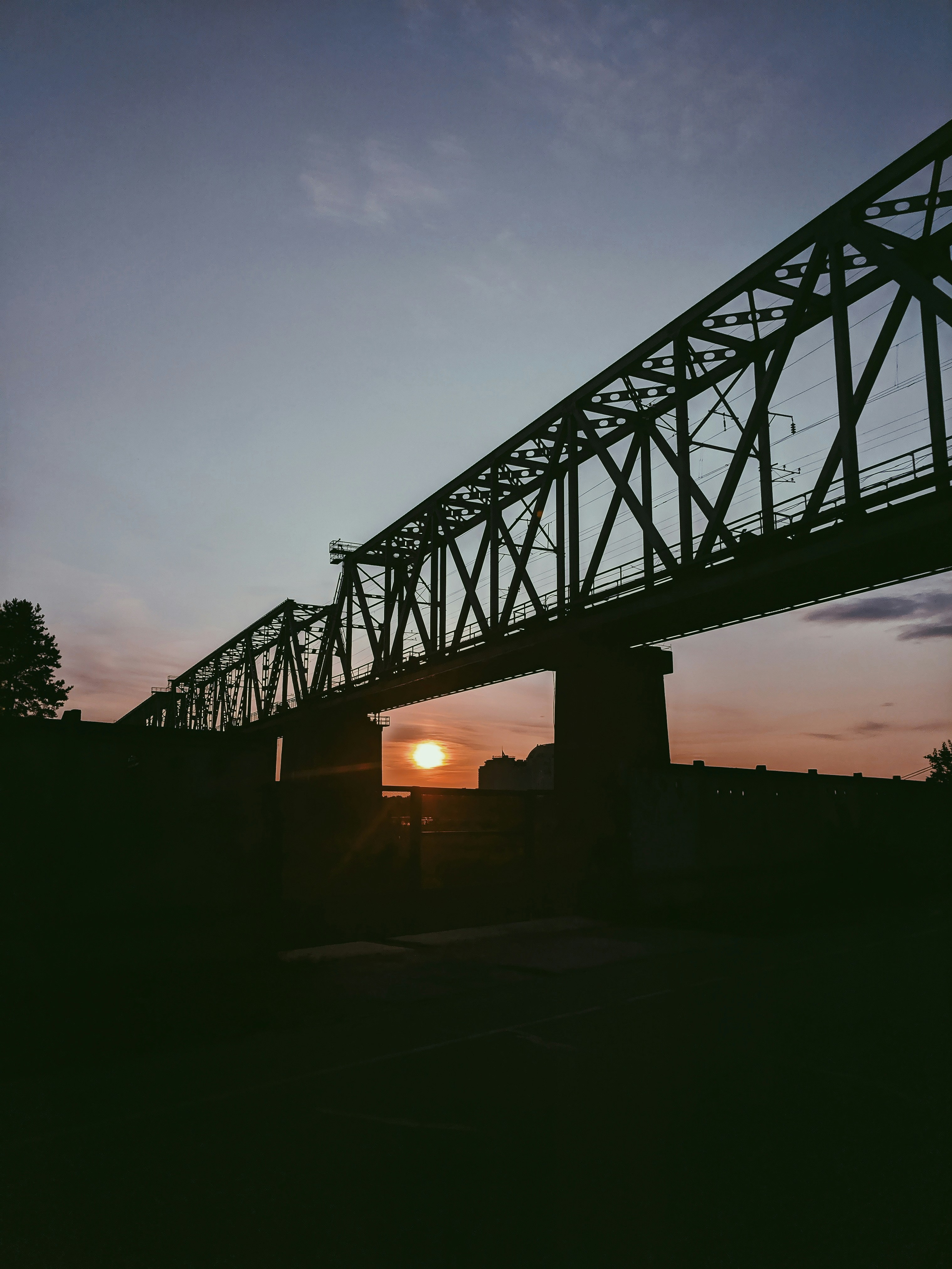 steel bridge under clear blue sky