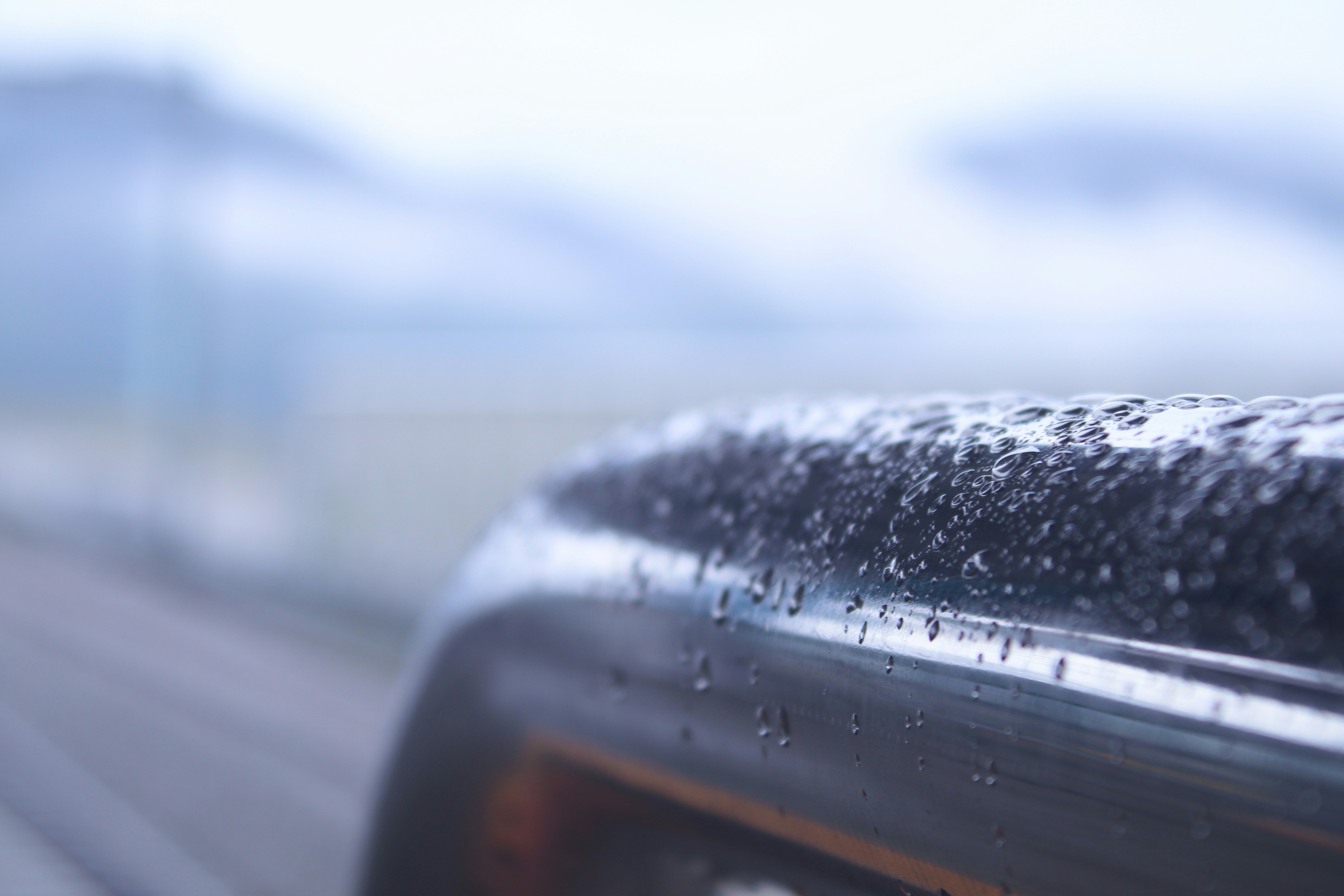 a close up of a car's rear view mirror