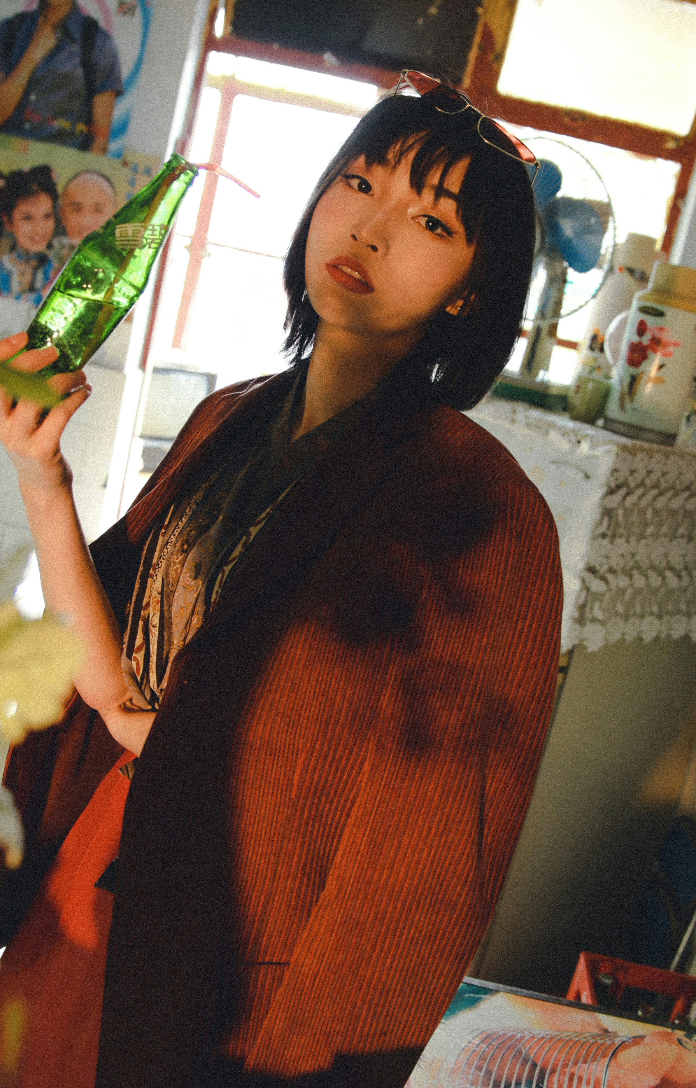 Green Bottle, Quiet Moment: A Portrait in a Cluttered Interior