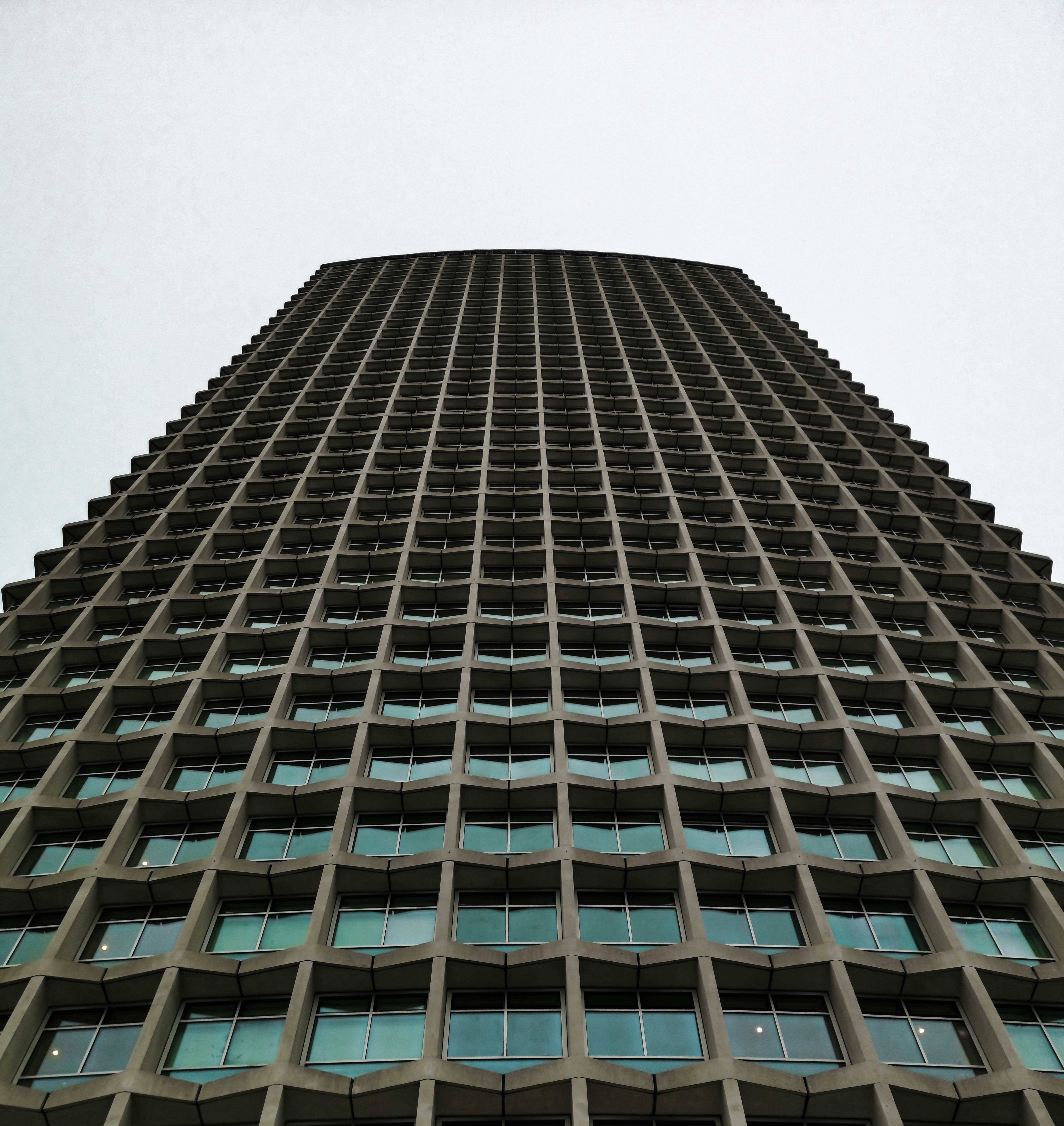 Worm's-eye view of gray tower building photo – Free Building Image on ...
