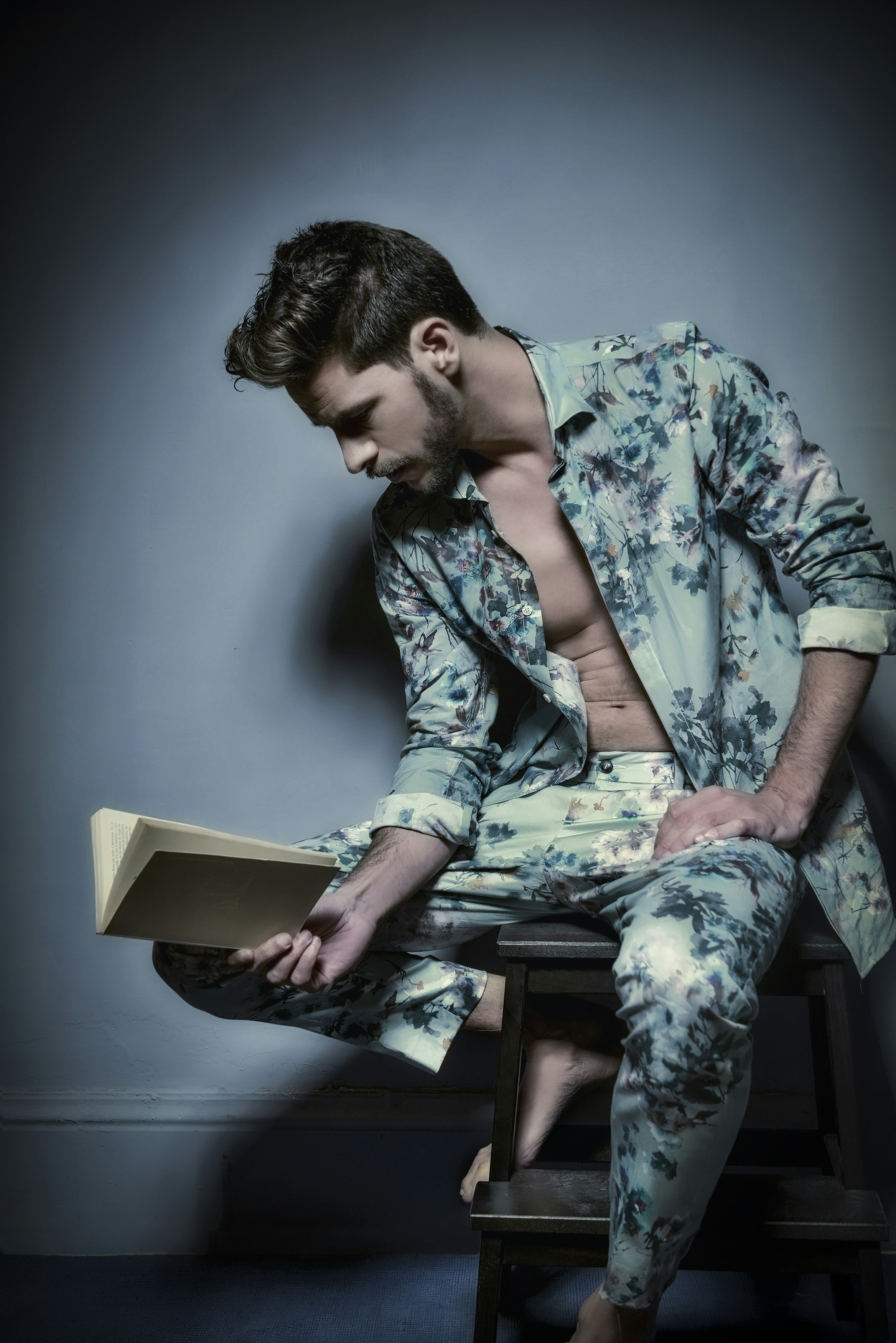 Midnight Reader: A Quiet Moment in Floral Linen