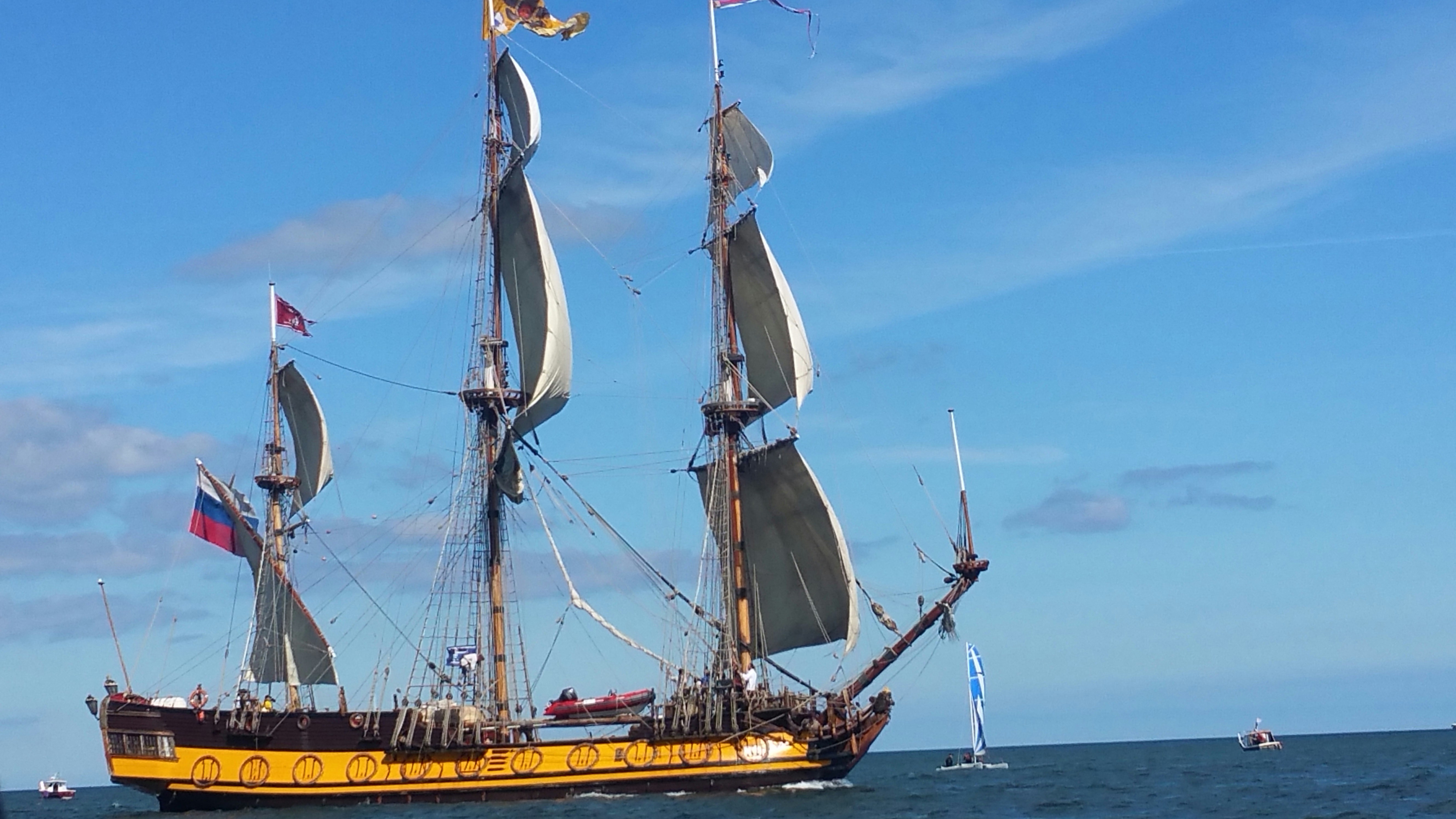 yellow ship photo – Free Blue Image on Unsplash