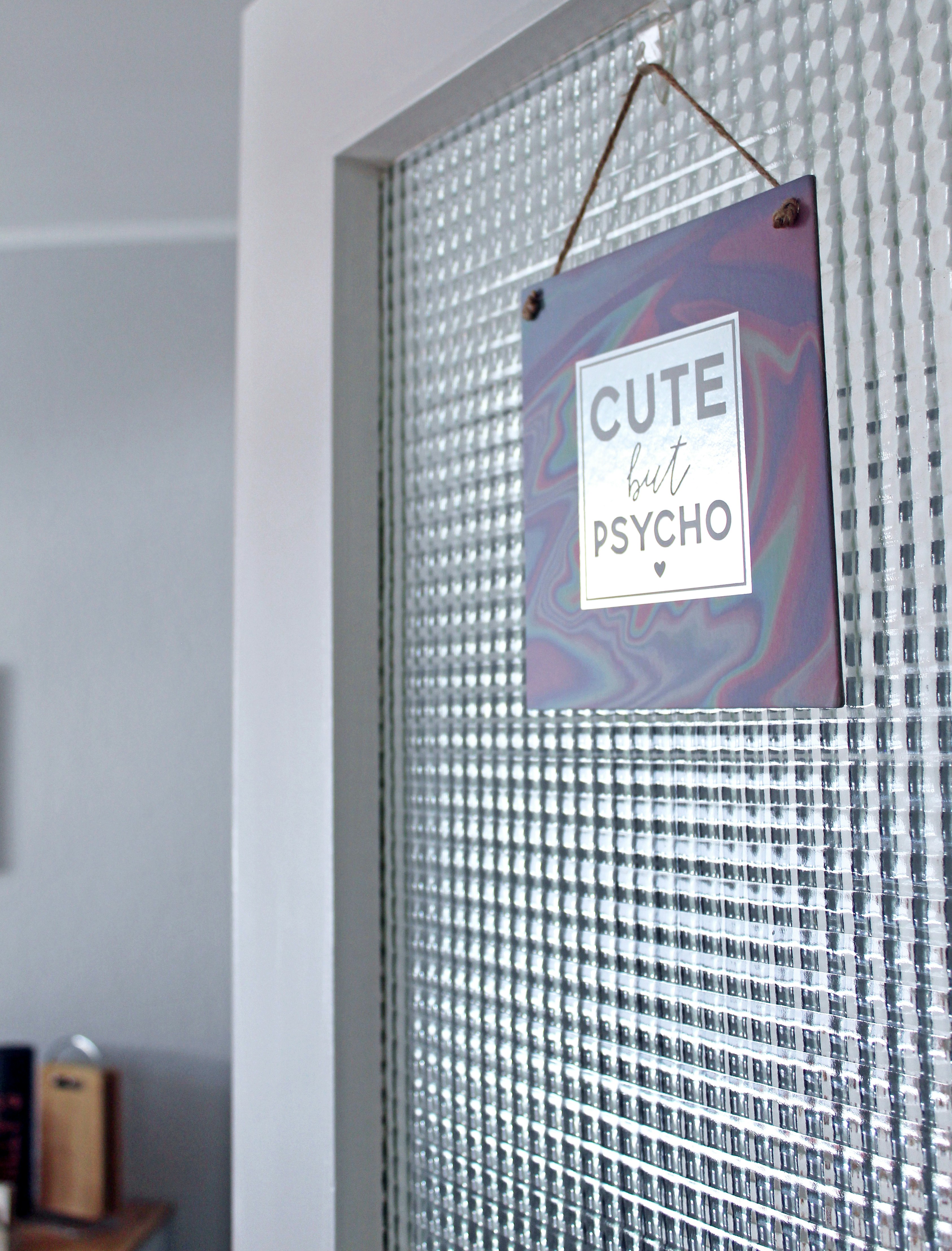 Whimsical Dichotomy on Frosted Glass: 'CUTE but PSYCHO' Sign