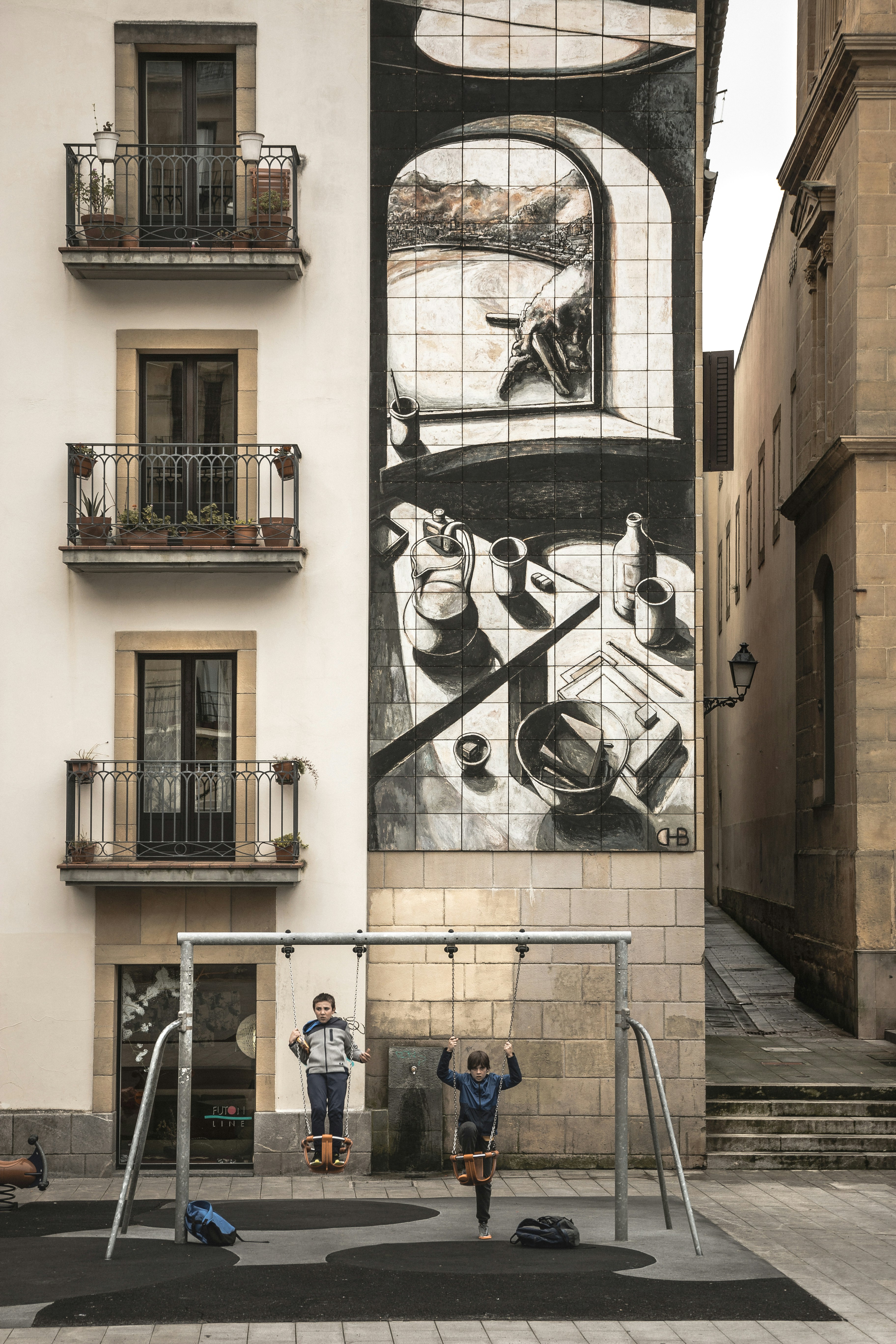 Two person standing beside wall photo – Free Art Image on Unsplash