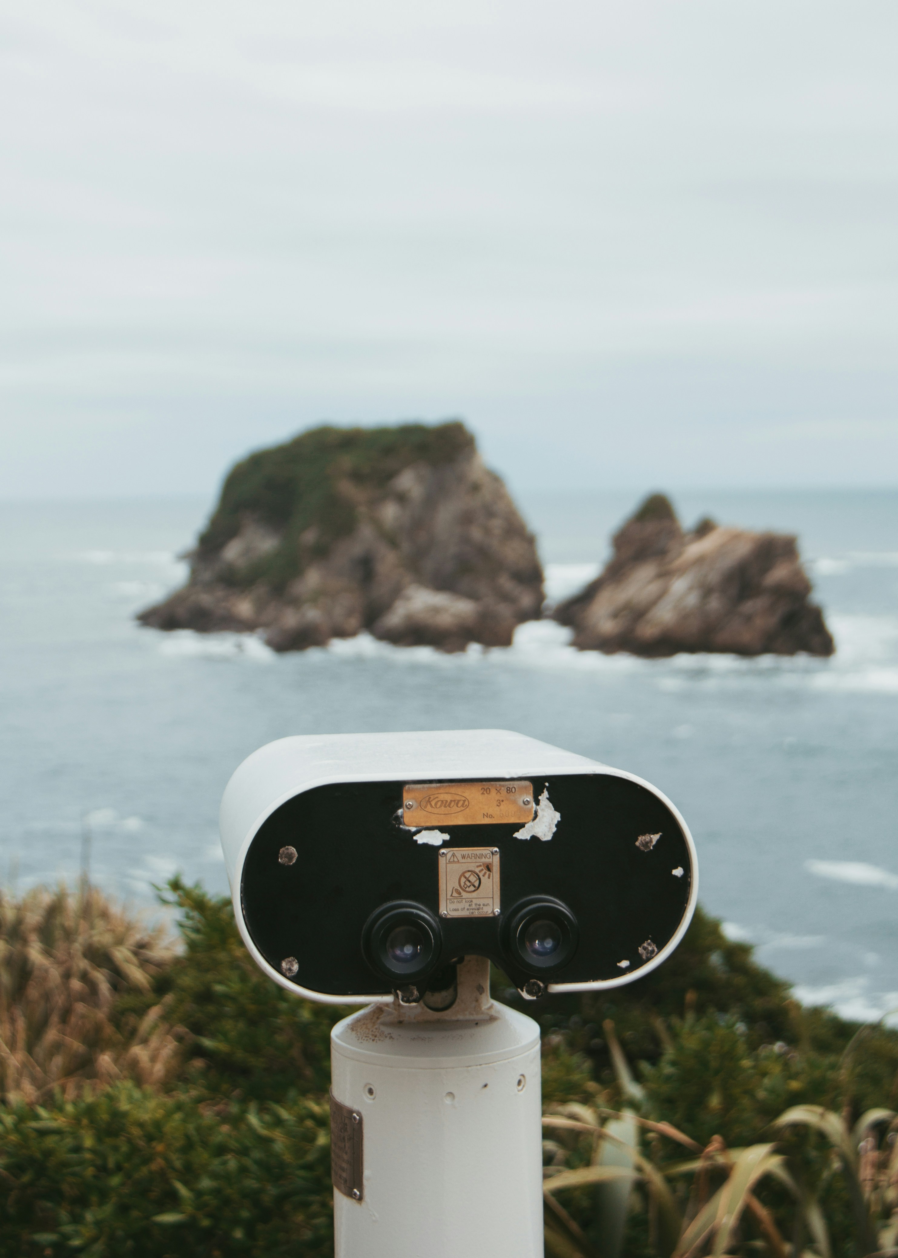 Viewfinder Overlook: Twin Islets Rise from a Calm Sea