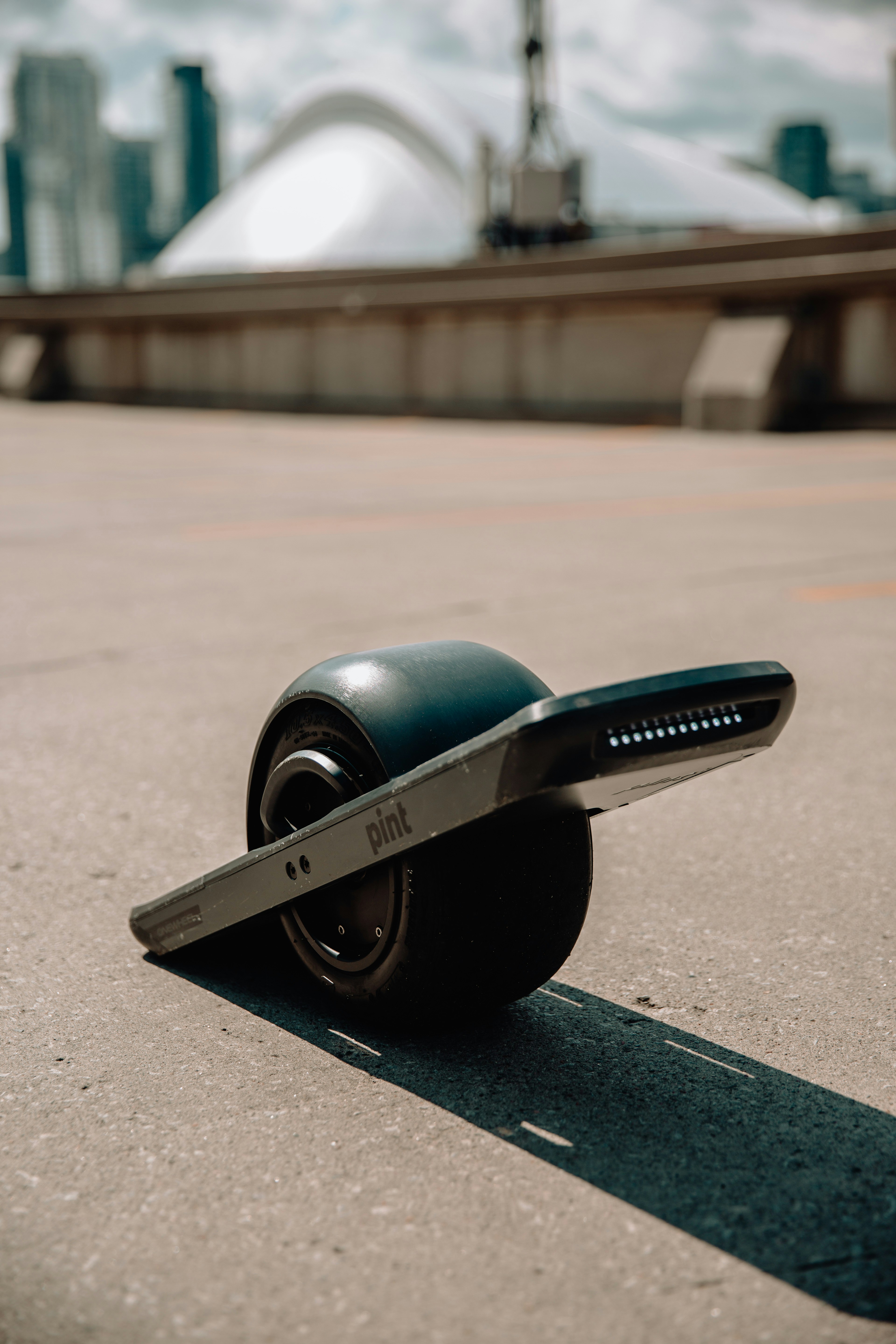 Hovering in Focus: A lone Kick Scooter on a Rooftop Storming the View
