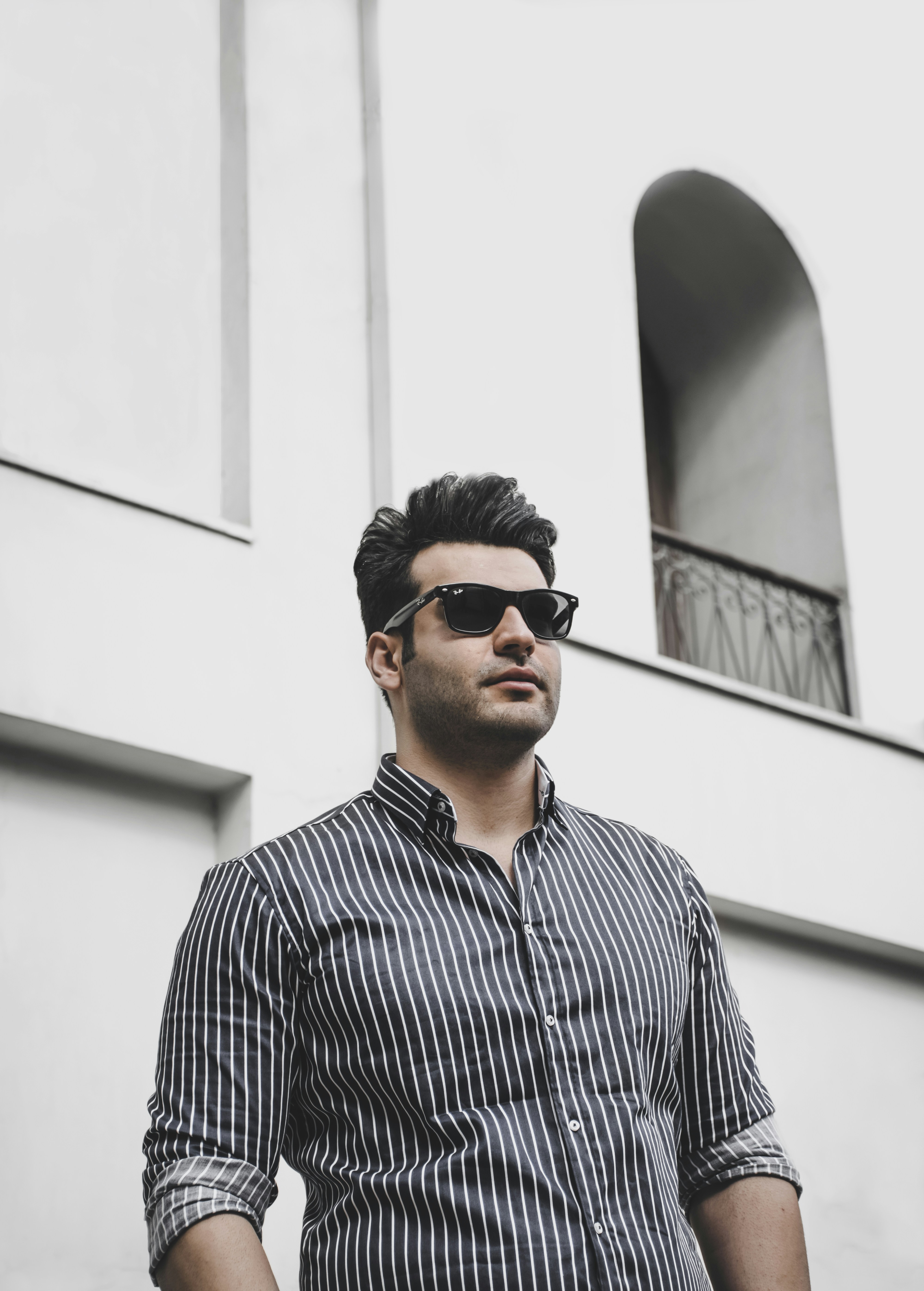 Women's black and white striped button-up collared shir photo – Free ...