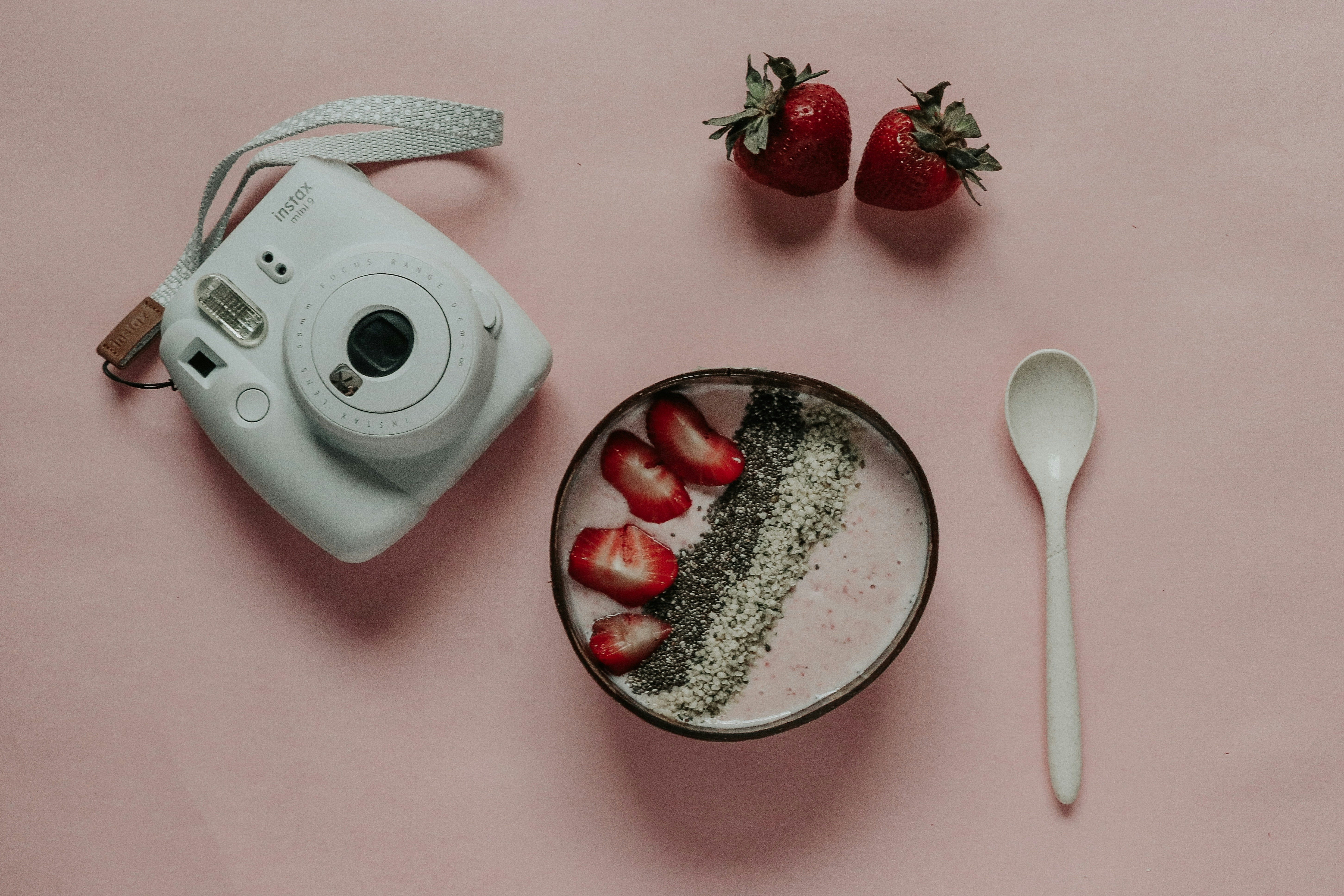 white Fujifilm Instax Mini 8 camera