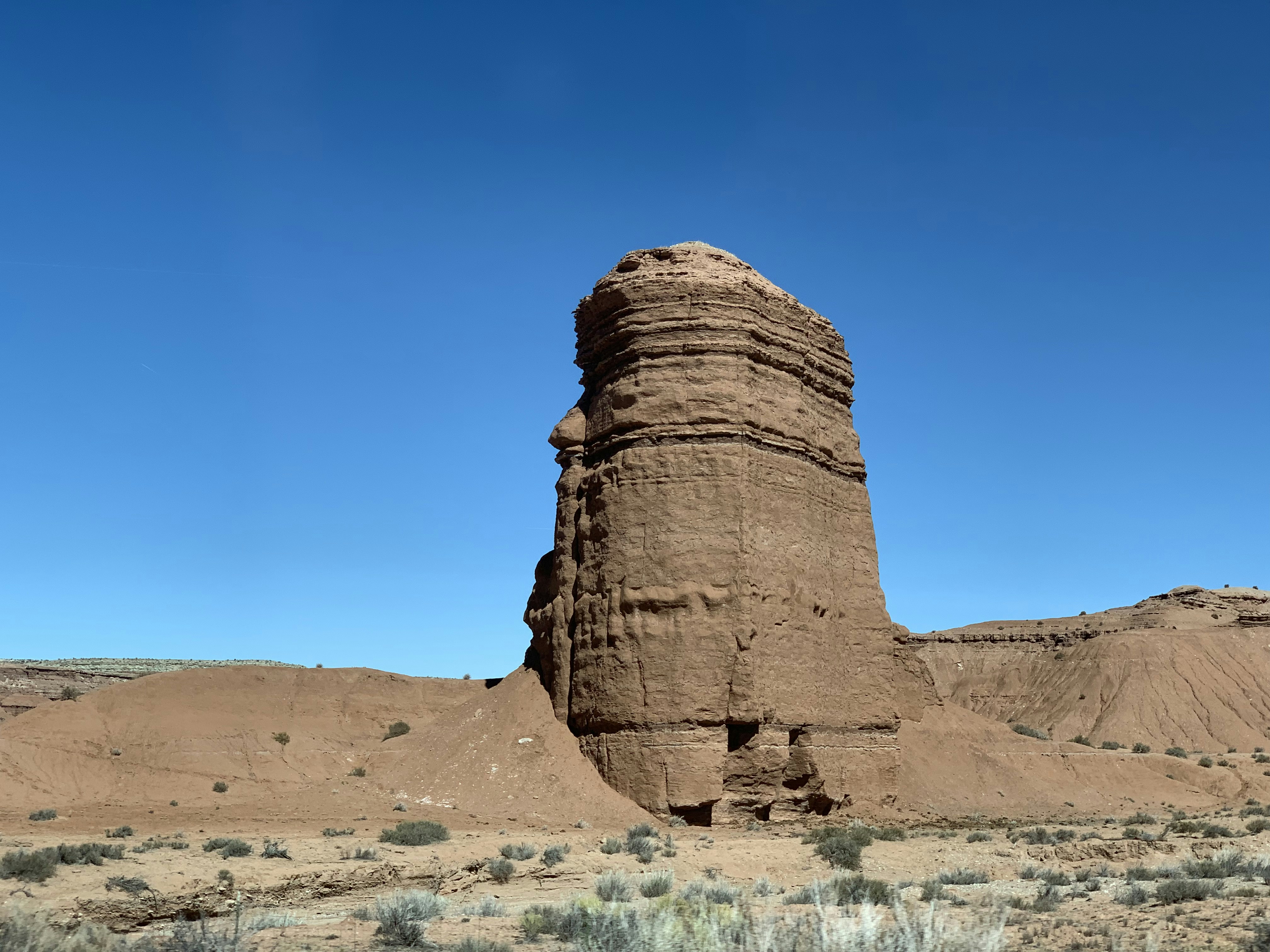 A large rock formation in the middle of a desert photo – Free Nature ...