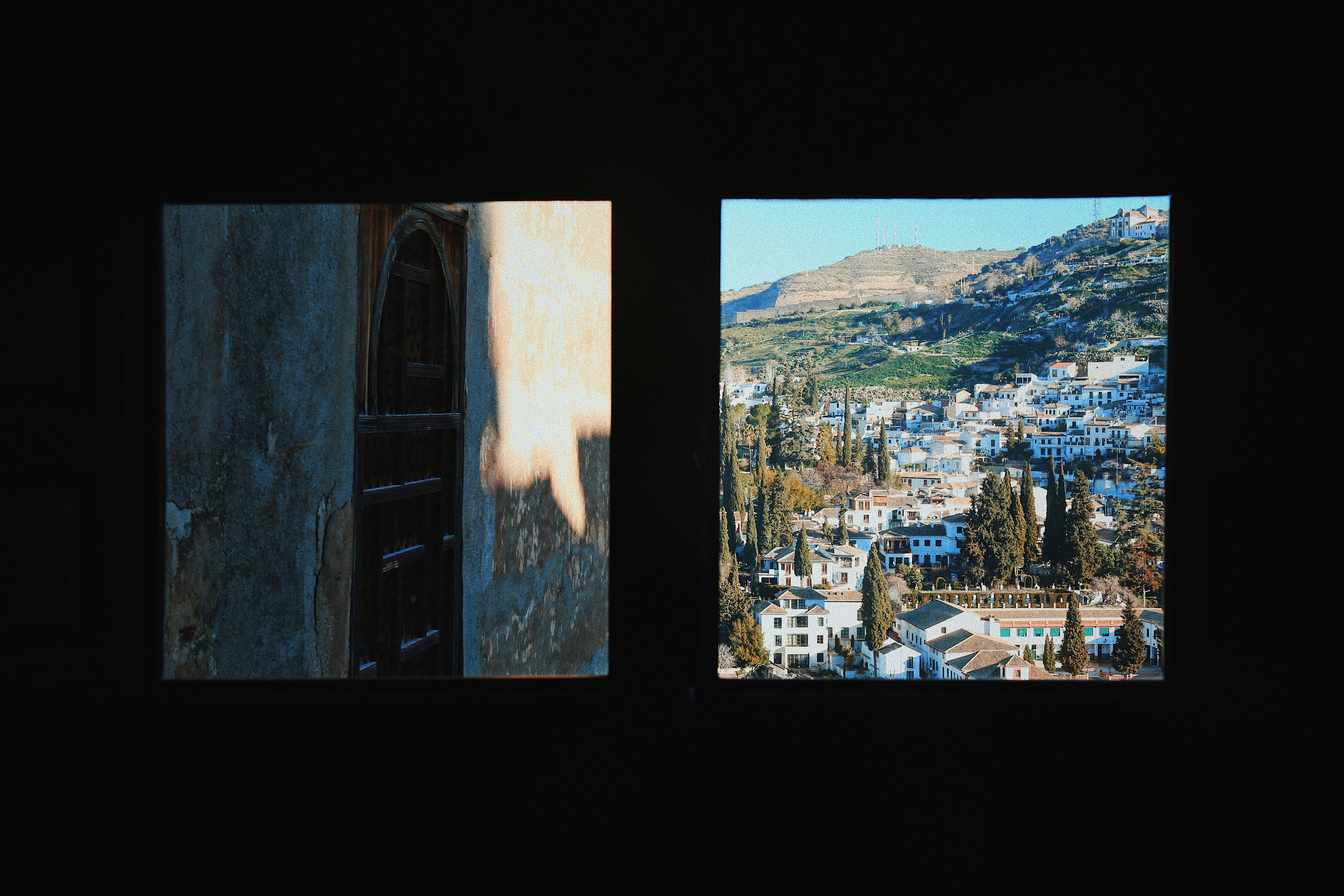 Split View: A Quiet Doorway and a Sunlit Town Across the Ridge